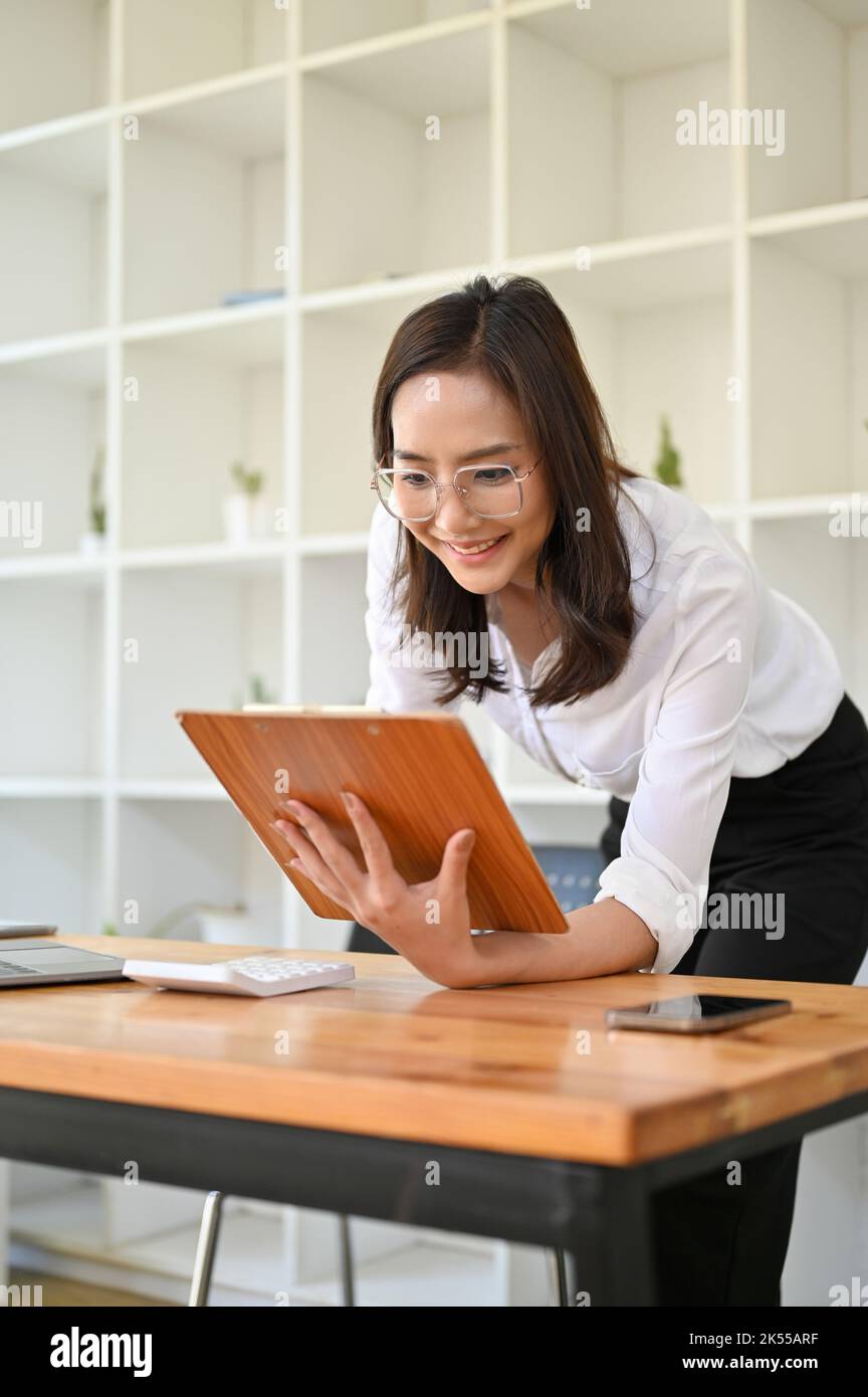 Portrait, Beautiful and professional millennial Asian businesswoman or ...