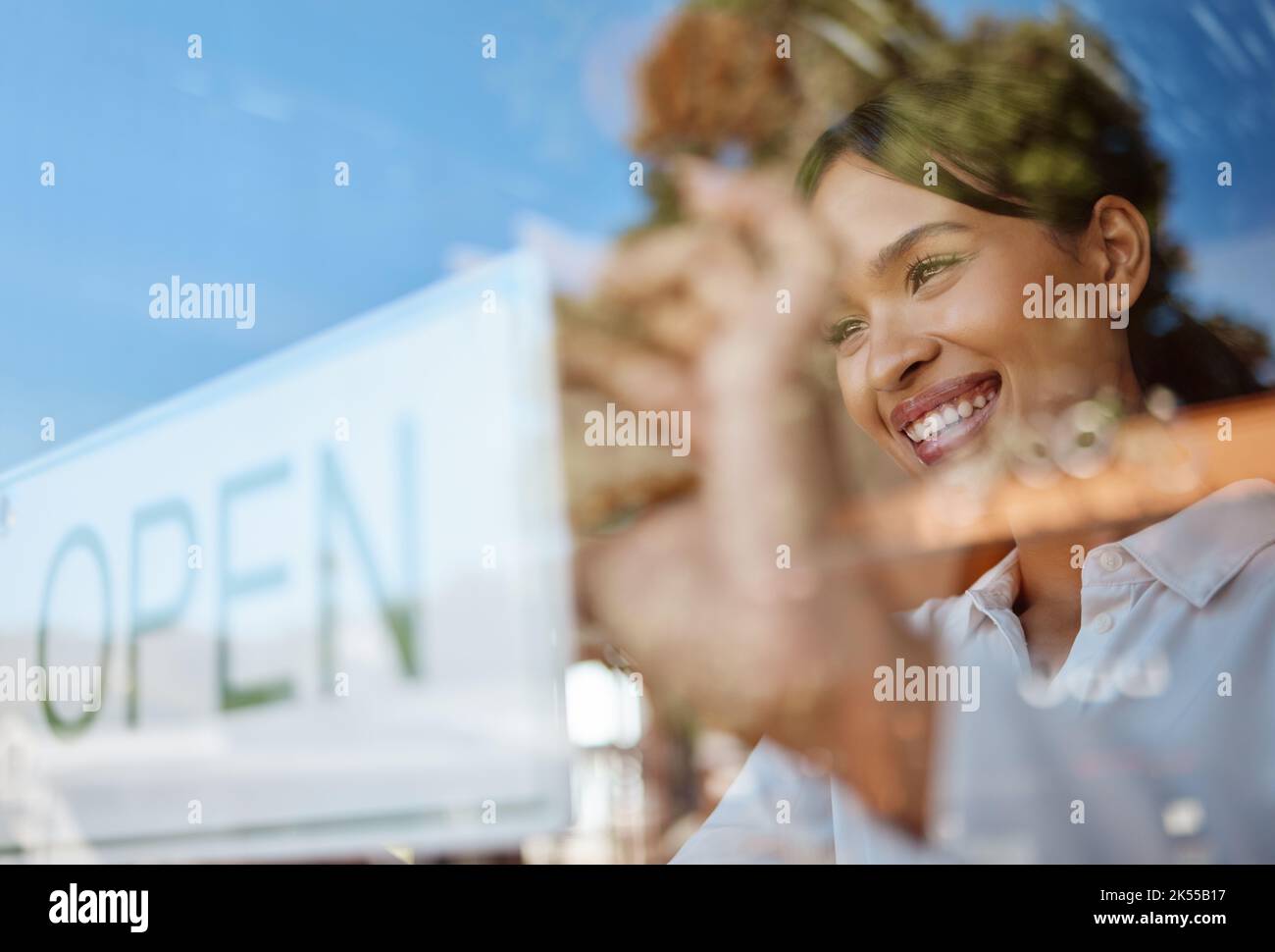 Open sign, coffee shop and woman opening small business feeling proud ...