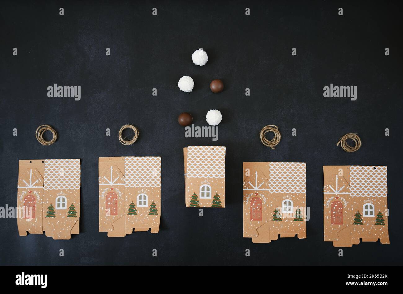 Handmade Christmas gift boxes with chocolate sweets for New Year. DIY ...