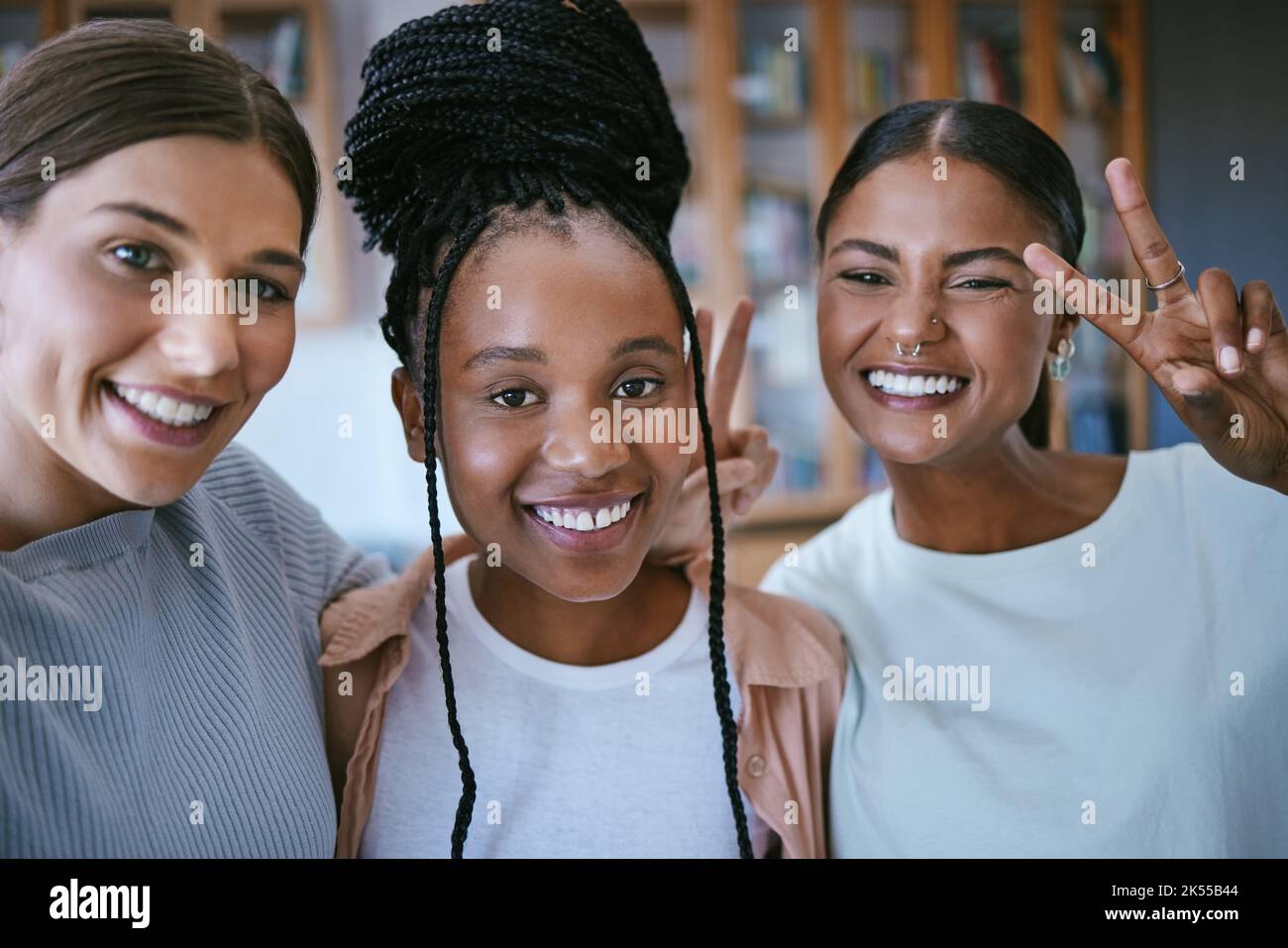 Selfie, peace sign and a group of girl friends with smile on face in ...
