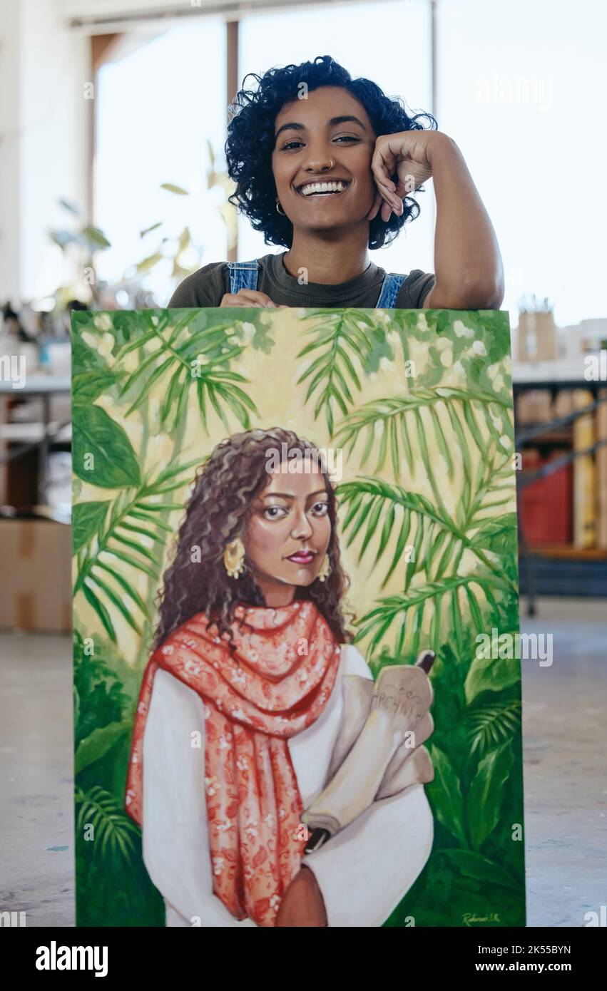 Art, portrait and woman with pride in her painting while working at a ...
