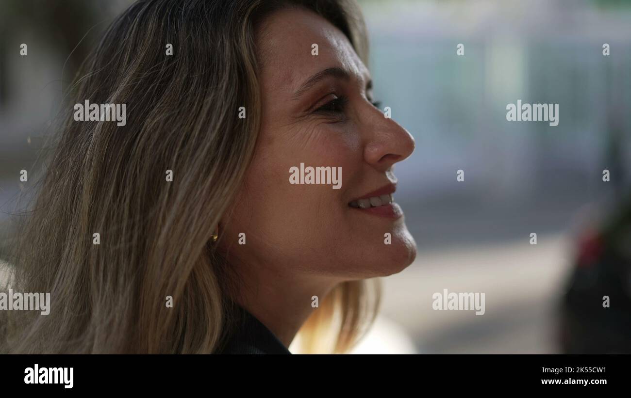 Carefree Person walking in street observing environment. Happy ...