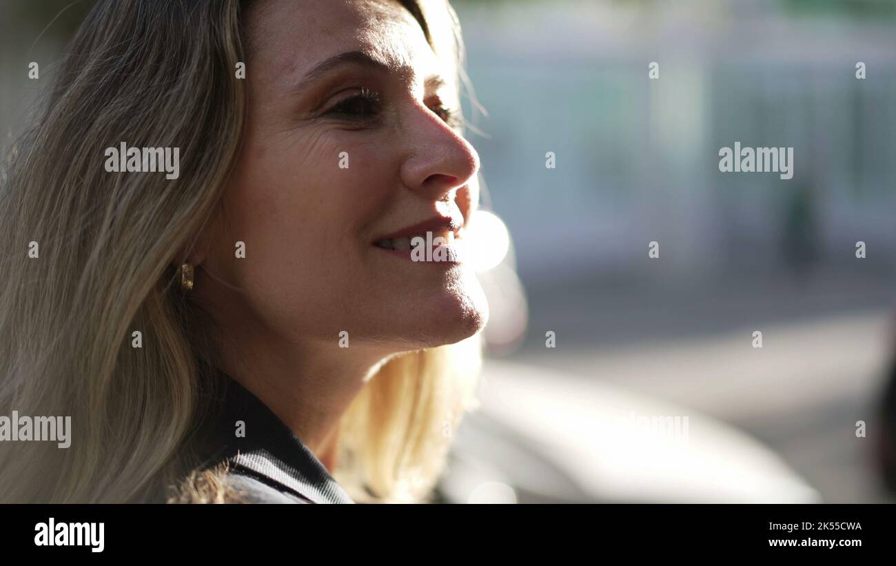 Carefree Person walking in street observing environment. Happy ...