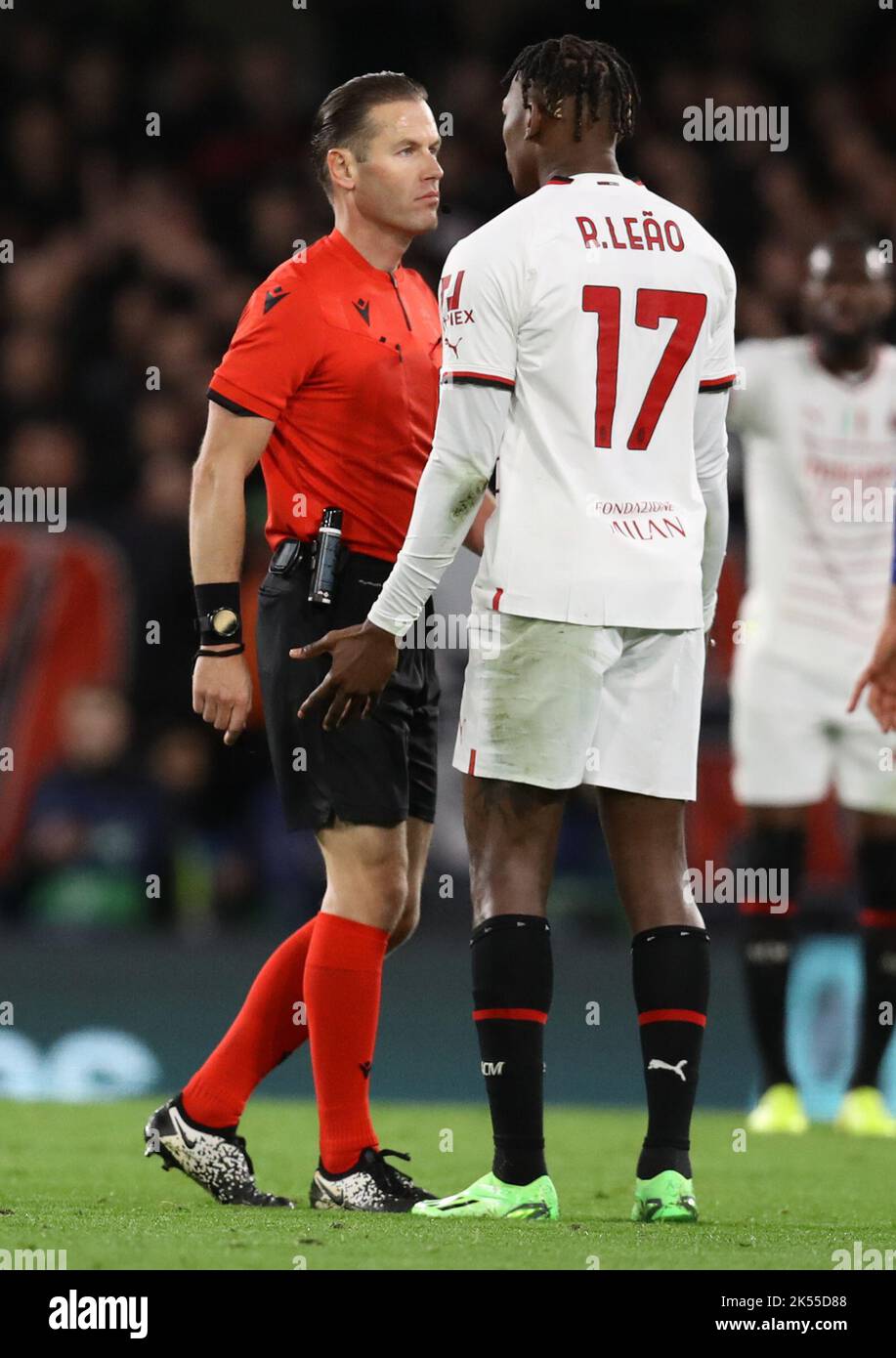 London, England, 5th October 2022. Rafael Leão of AC Milan and referee ...