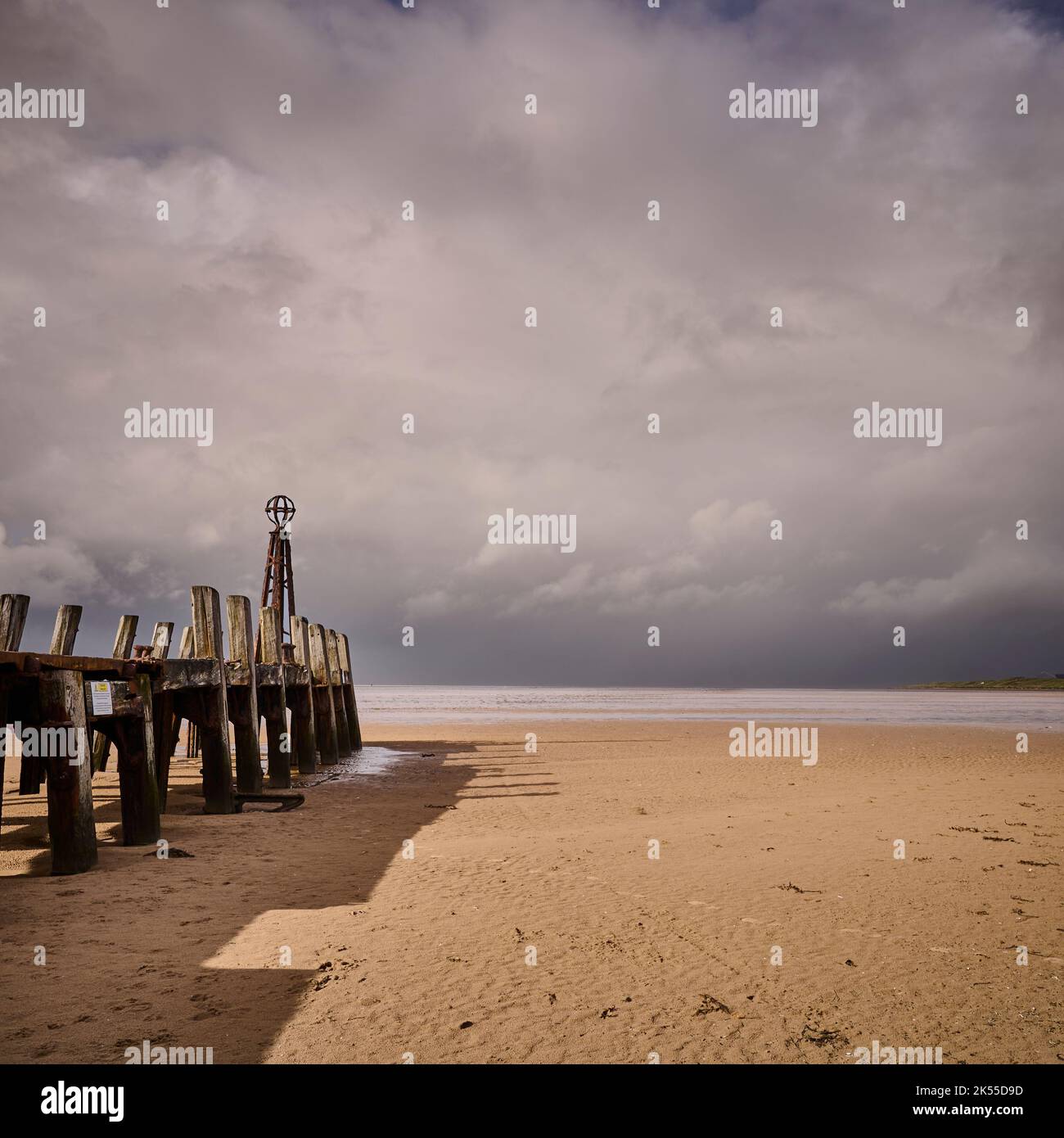 Remains of old wooden pier on St Annes beach,Lancashire,UK Stock Photo ...