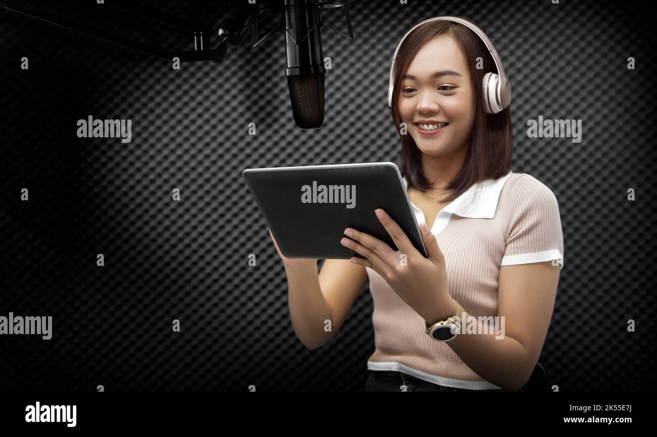 Asian women voice their voices or record annoucement a song in the ...