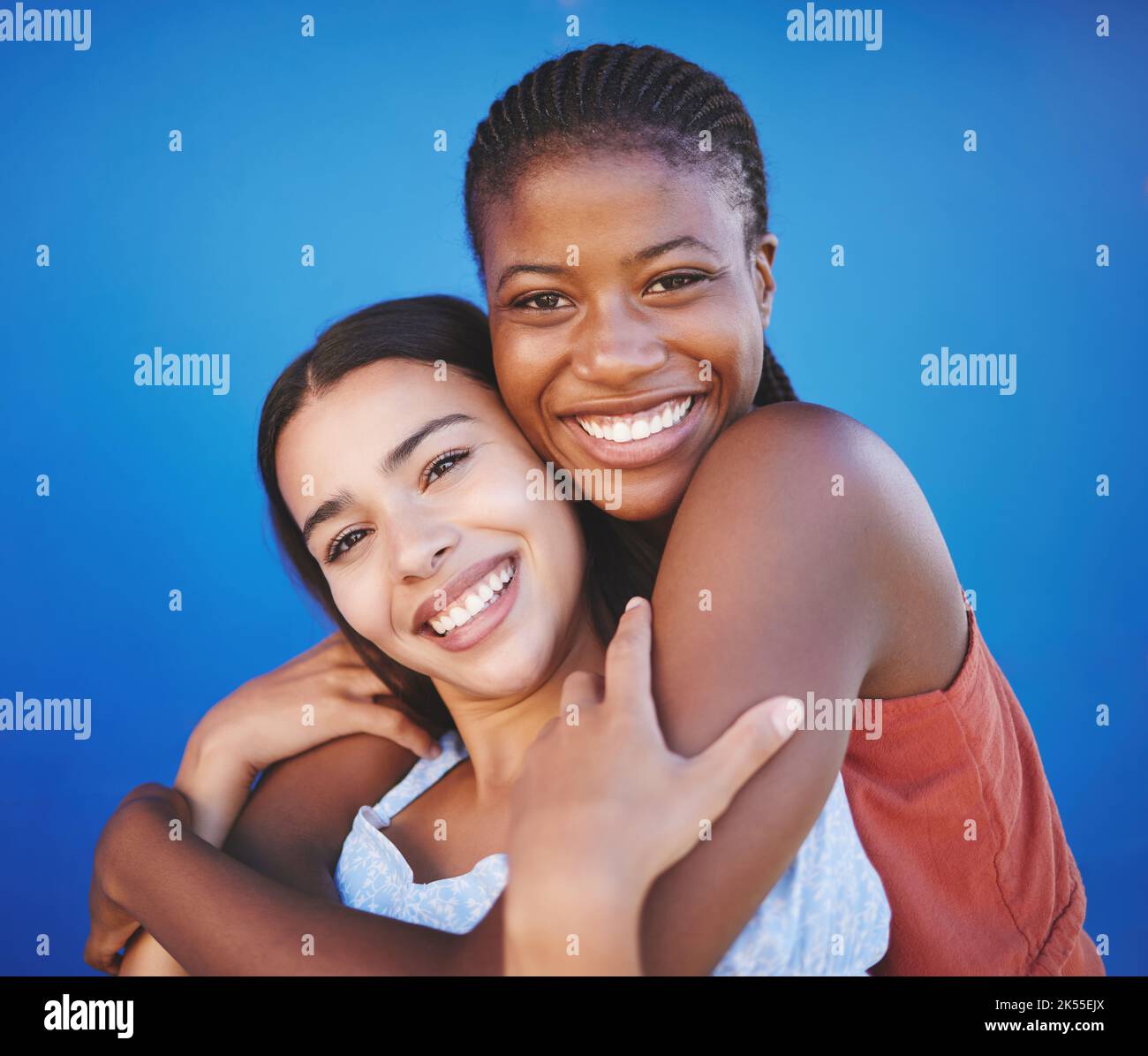 Happy, friends and portrait of women hugging for support, empowerment and love in studio ...
