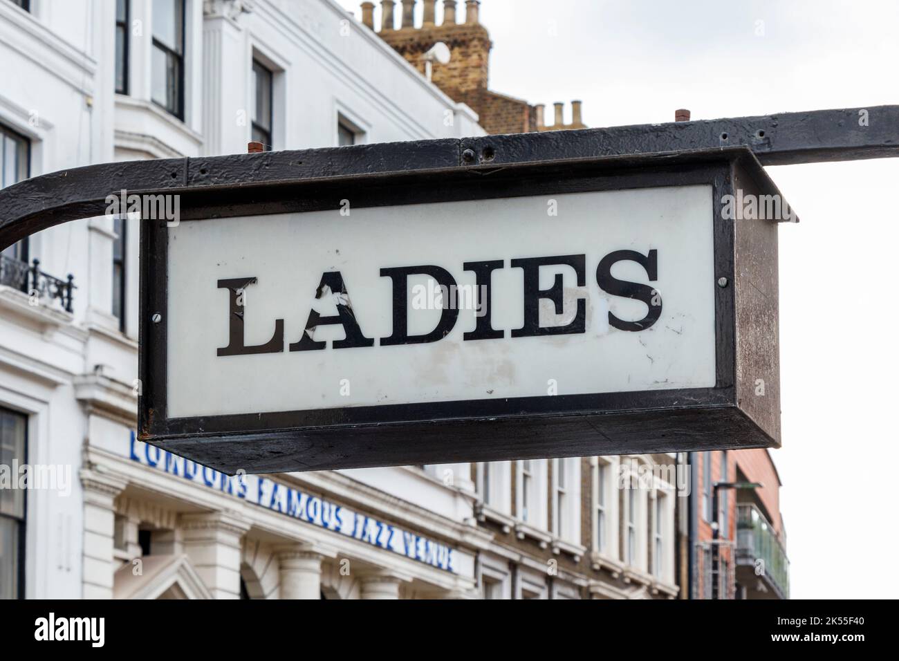 Illuminated 'Ladies' sign above the women's public convenience, or ...