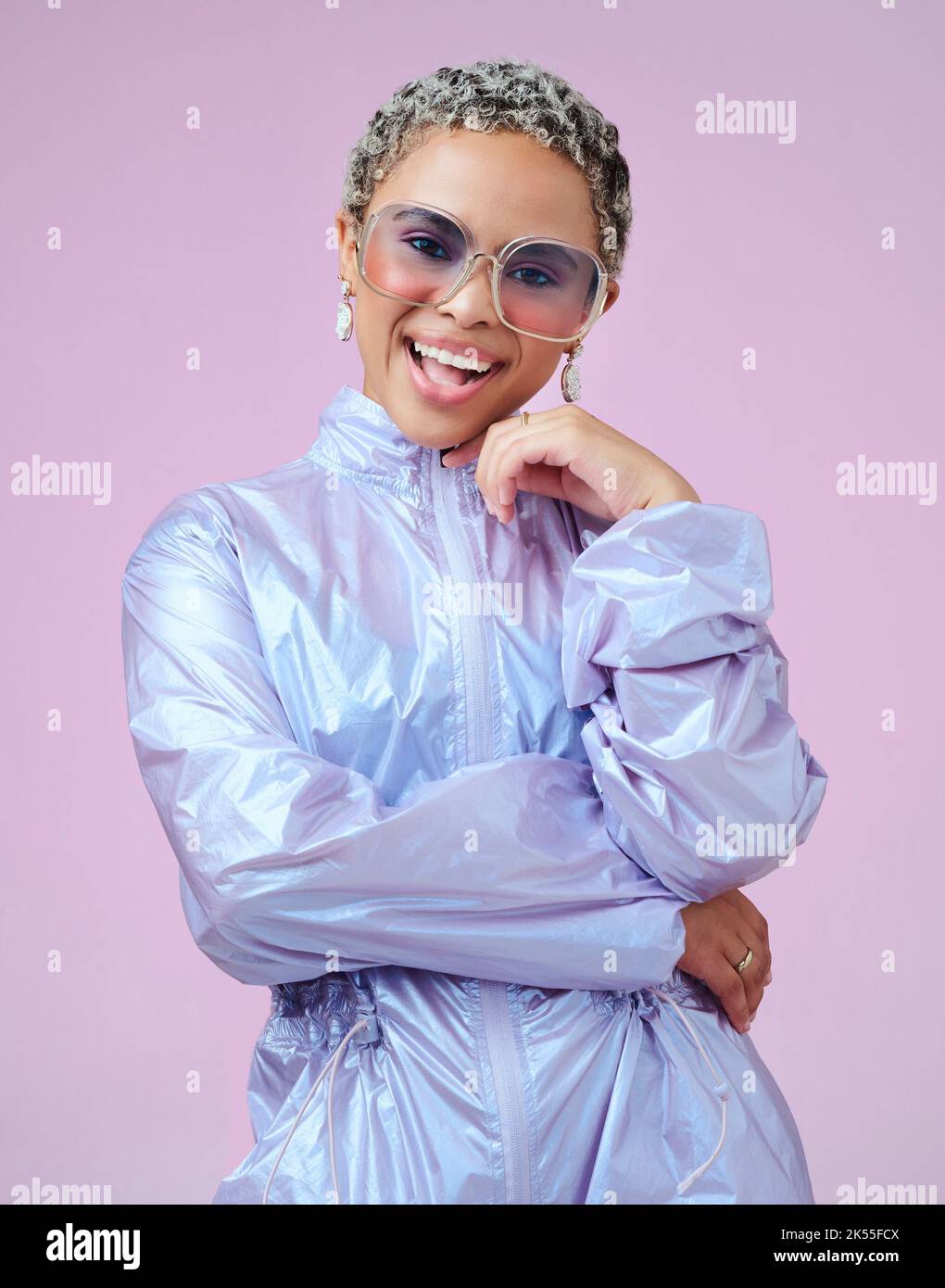 Black woman, fashion and sunglasses in jacket on purple background in ...