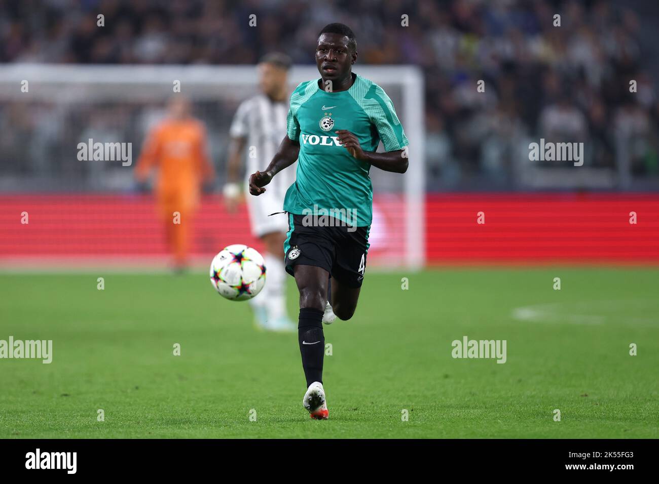 Turin, Italy. October 5, 2022, Ali Mohamed of Maccabi Haifa FC controls ...