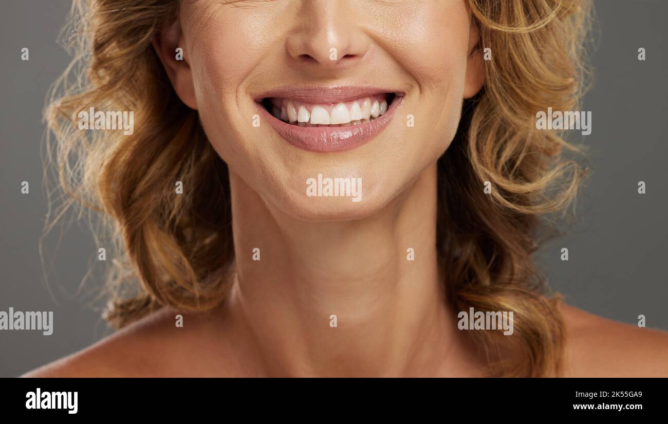 Woman, teeth and smile in zoom of face with happiness for cosmetics ...