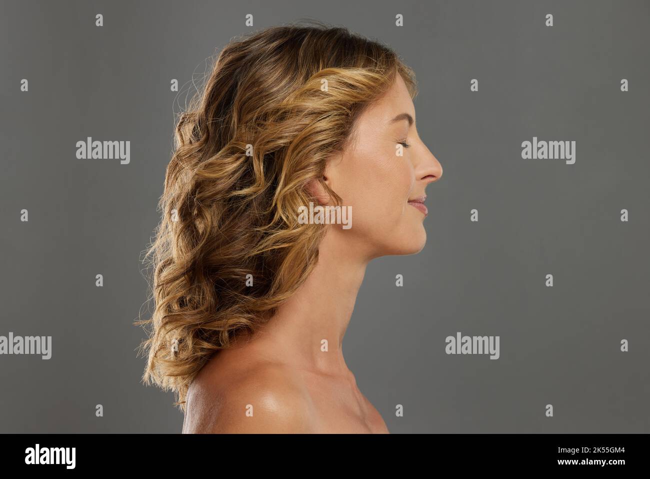 Beauty, skincare and profile of woman in studio with a wellness, health ...