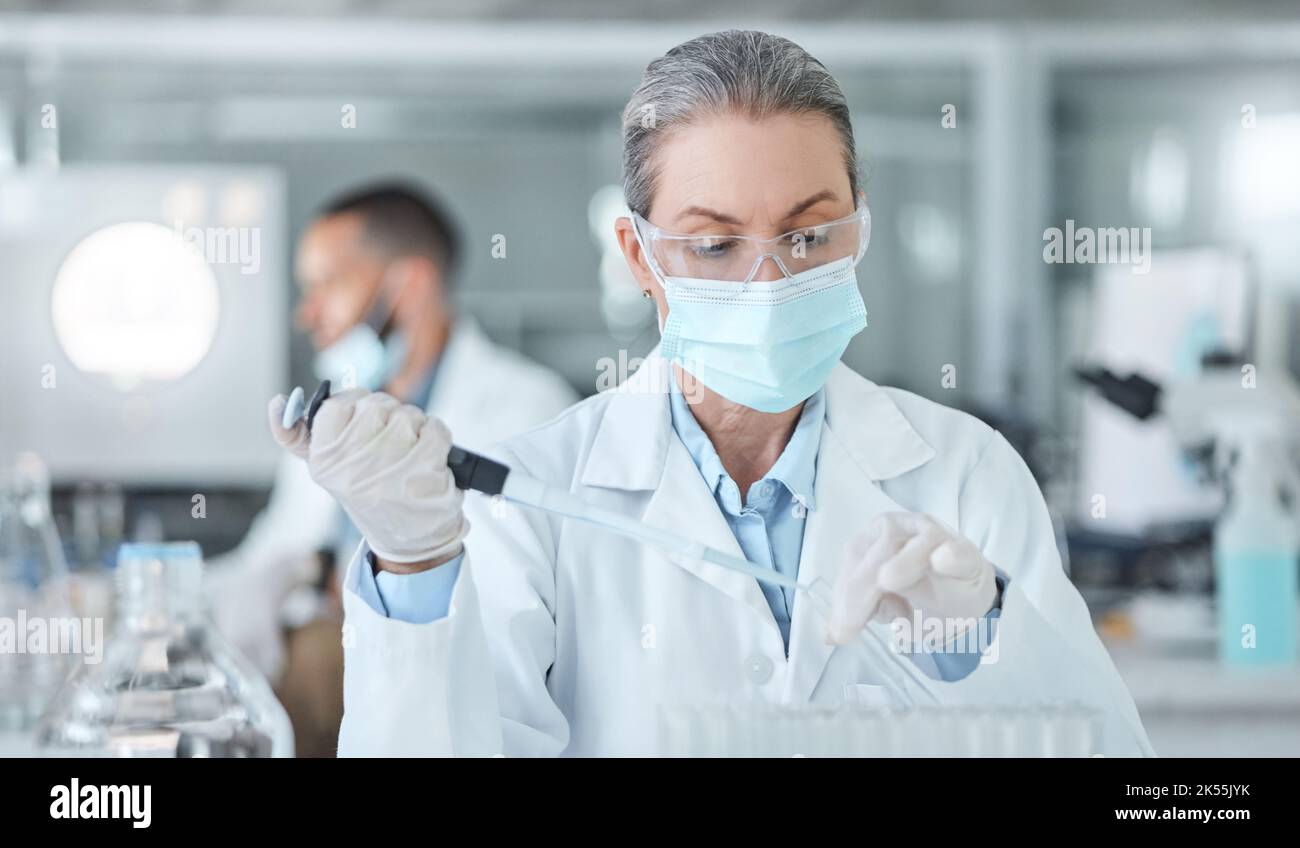 Covid, lab mask and vaccine research woman with medicine analysis test ...