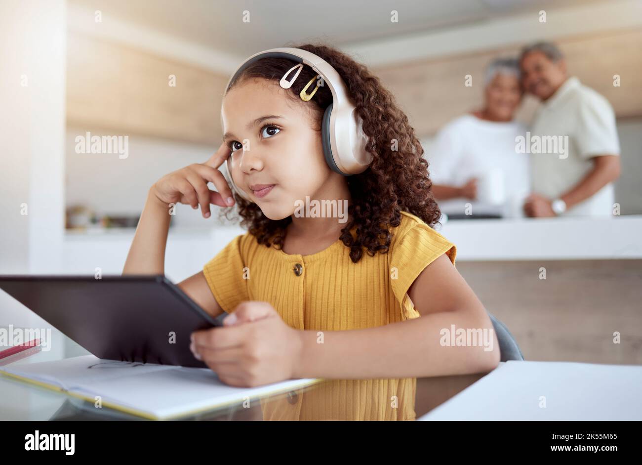Children, tablet and education with a girl thinking while distance ...