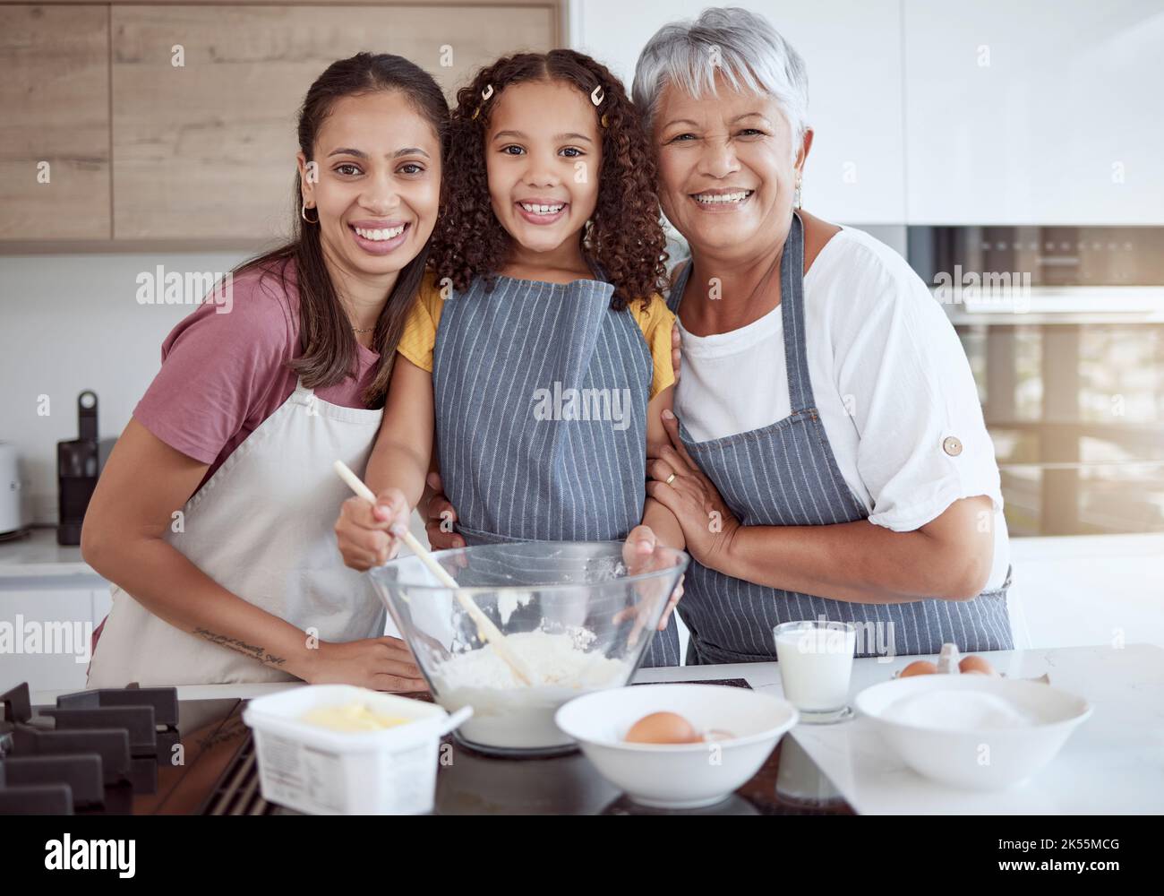 Cooking, girl and women bond in kitchen for dessert, breakfast food or ...