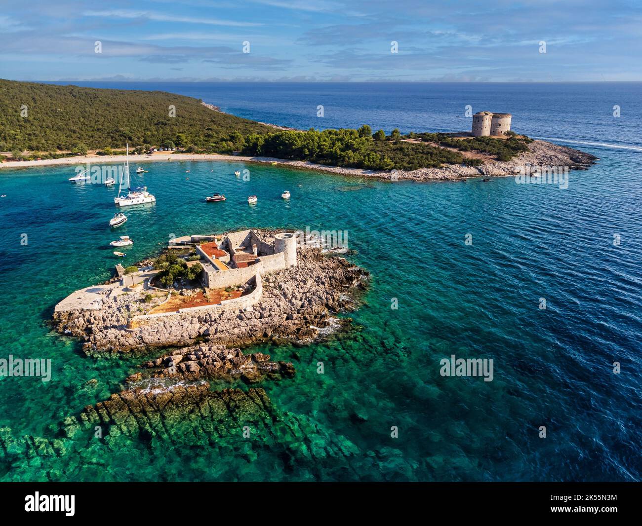 An aerial view of Mamula fortress on a rocky island with Arza Fortress ...