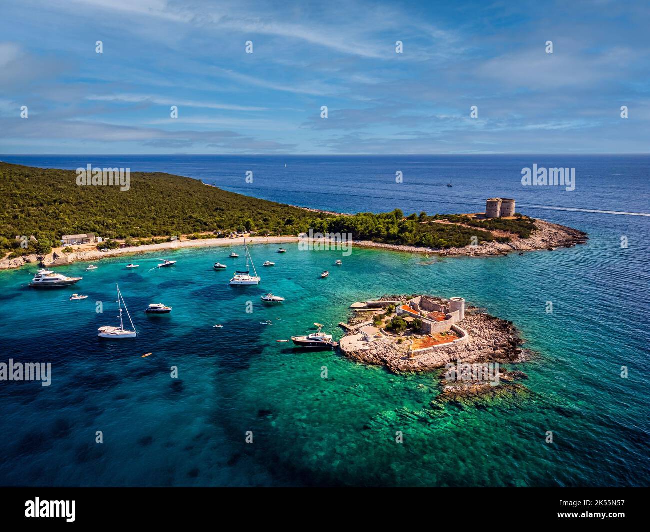 An aerial view of Mamula fortress on a rocky island with Arza Fortress ...