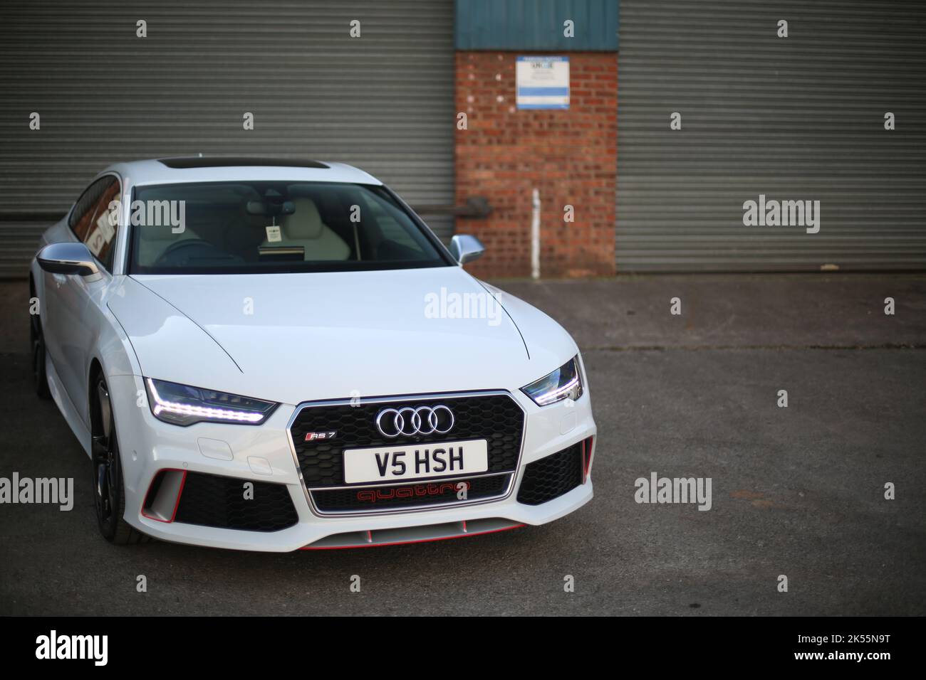 A Glacier White 2015 Audi RS7 With Diamond Cut Alloy Wheels And Red RS ...