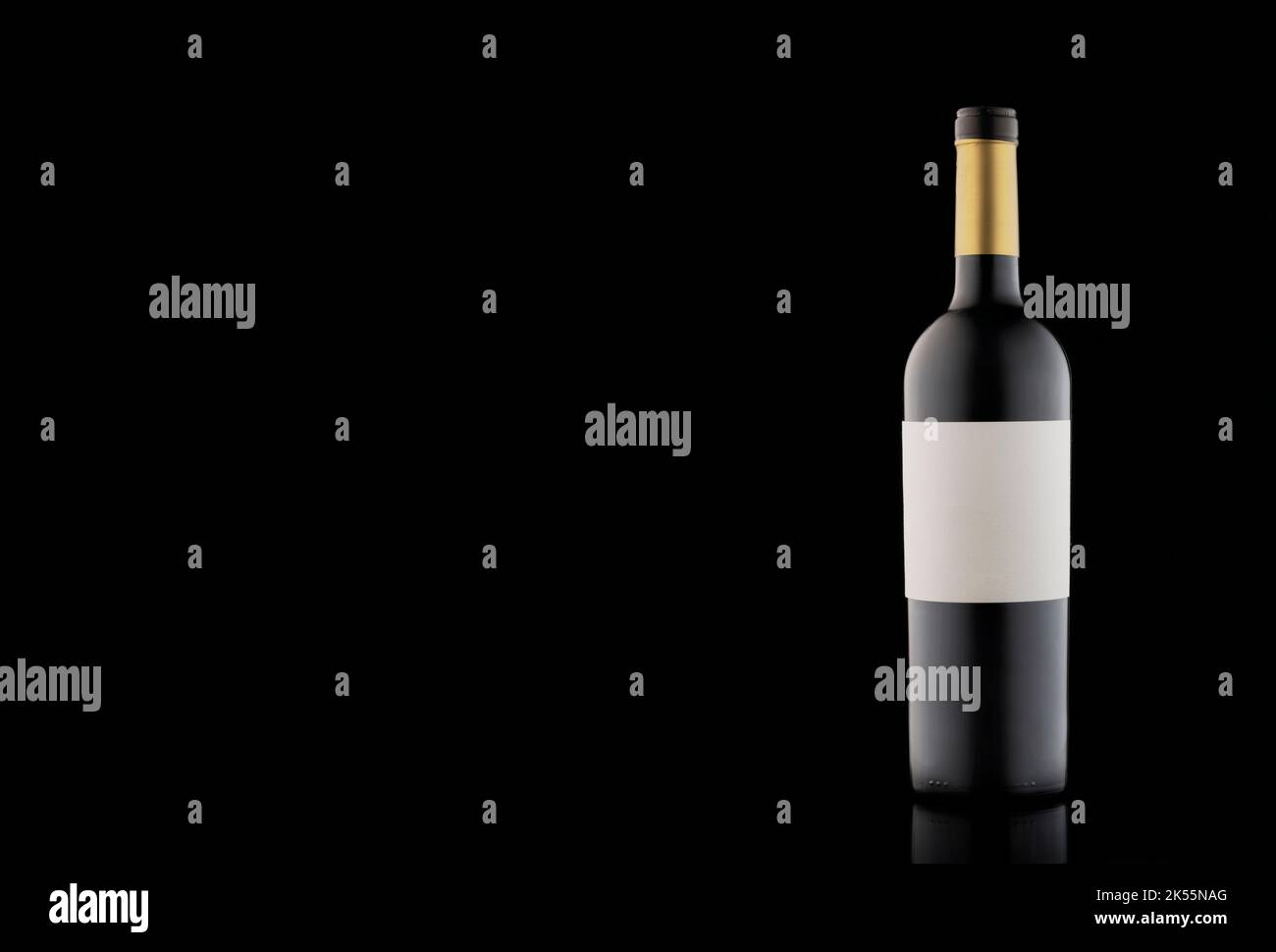 A bottle of wine with a beautiful highlight and gradient on a black ...