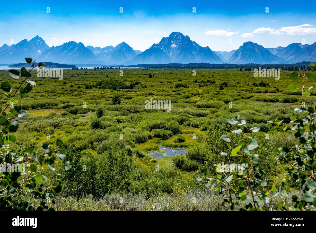 An aerial view of beautiful mountains near the forest in Yellowstone ...