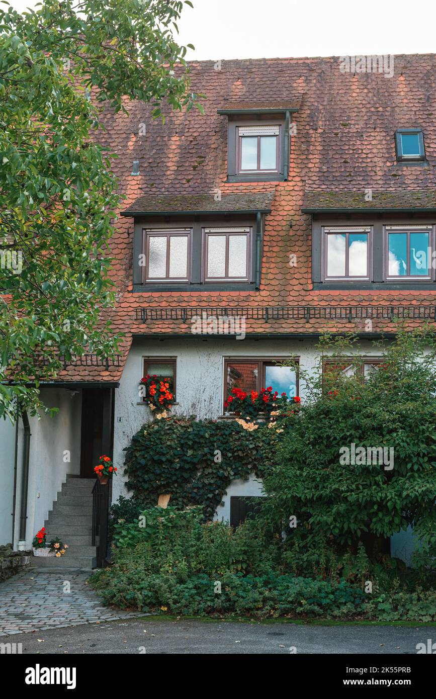 Traditional small house with beautiful outdoor decor facade in Germany ...