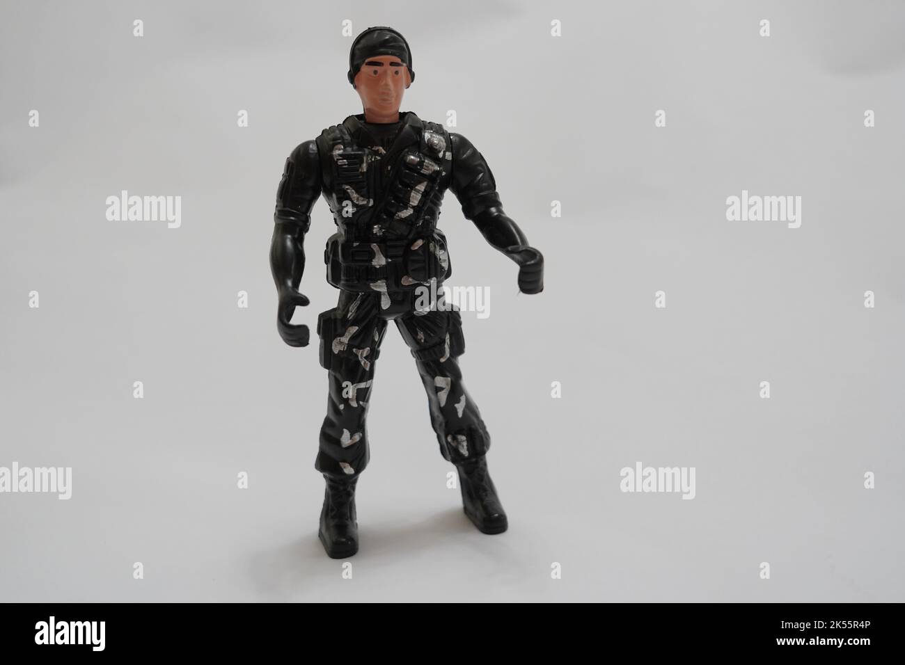 two soldier figurines arguing concept. armymen in green combat uniform ...