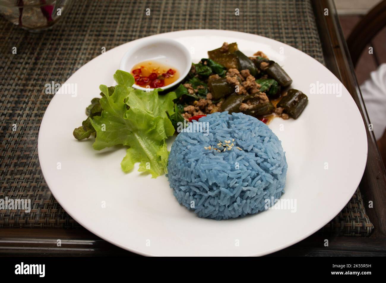 Thai chef cooking food fusion style cuisine Stir fried Eggplant with ...