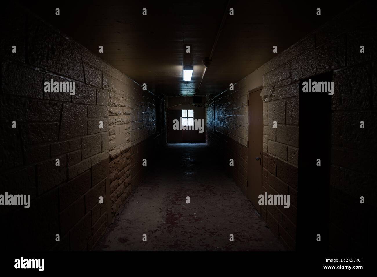 The hallway inside an old building illuminated by lamp light Stock ...