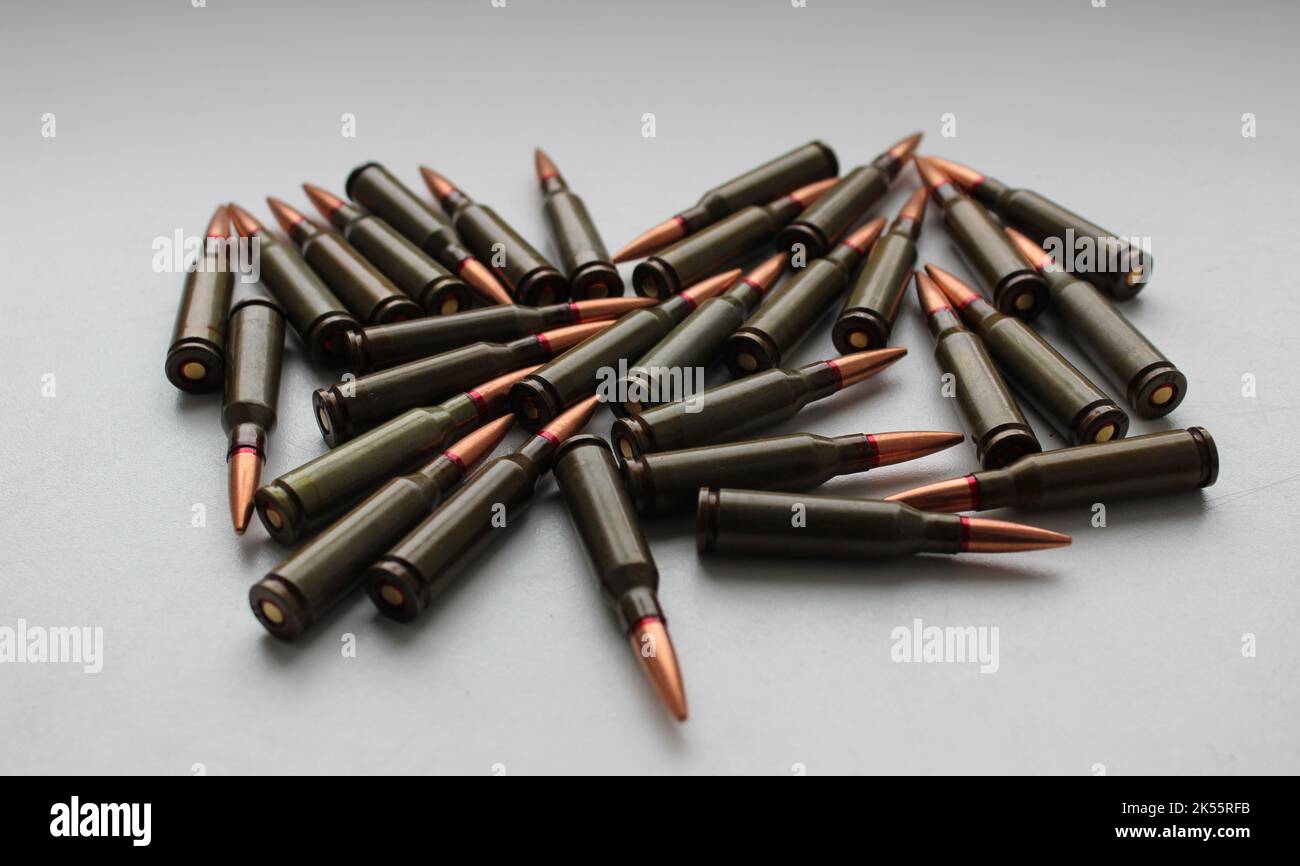 Live ammunition for assault rifle with red mark on a bullets studio ...