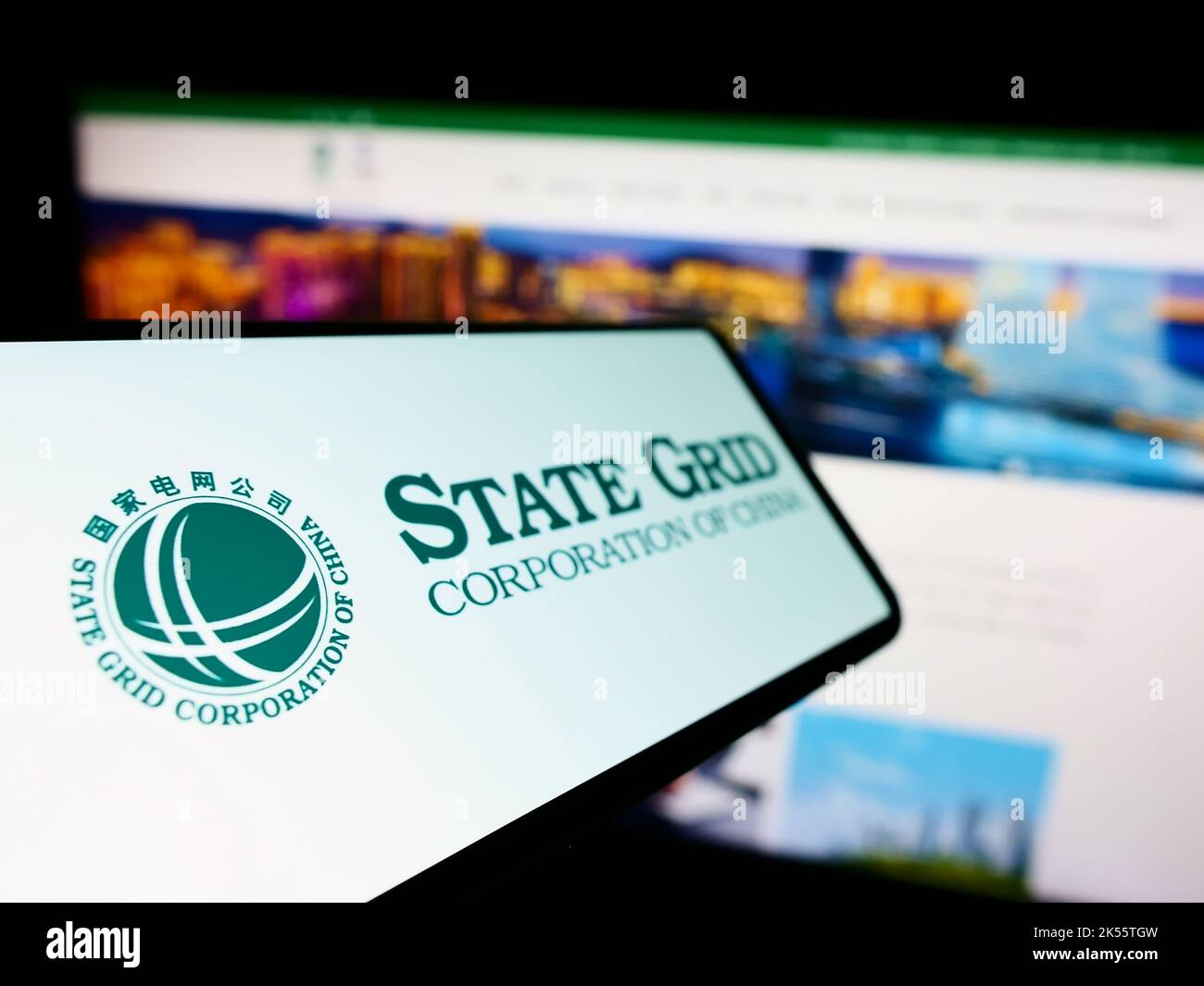Mobile phone with logo of company State Grid Corporation of China (SGCC ...