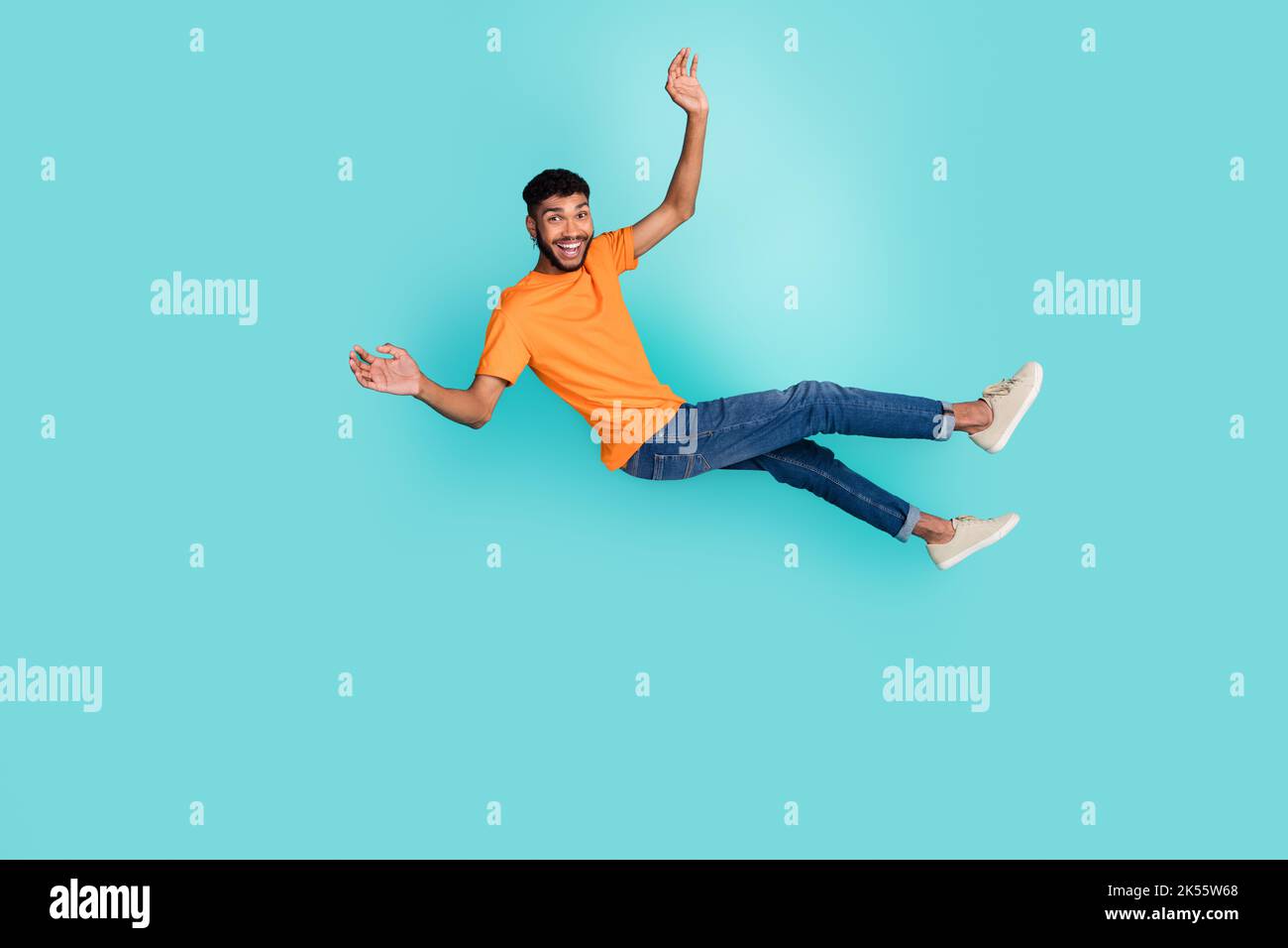 Full size portrait of overjoyed young person flying falling have good ...