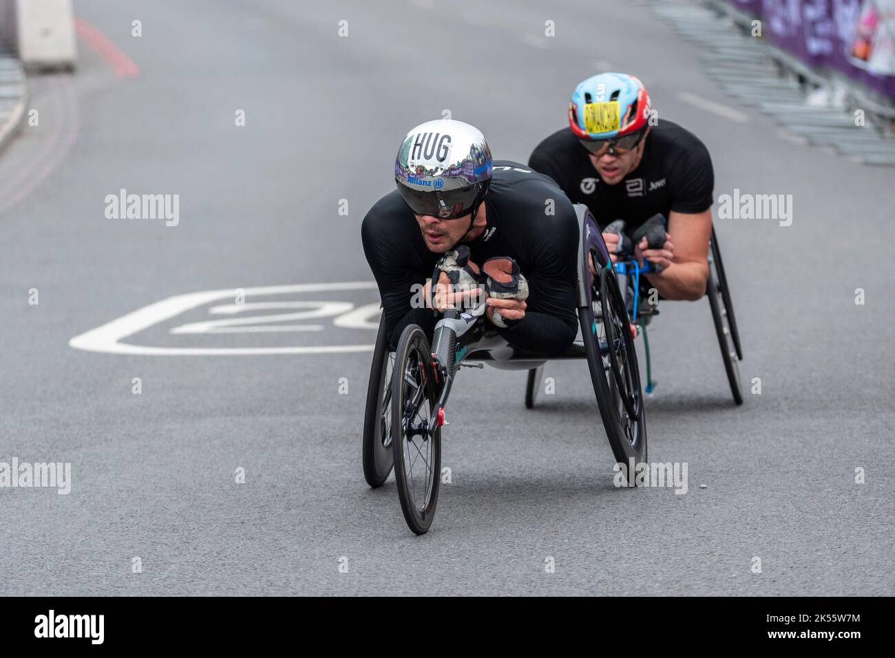 Marcel Hug and Daniel Romanchuk wheelchair athletes racing in the TCS ...