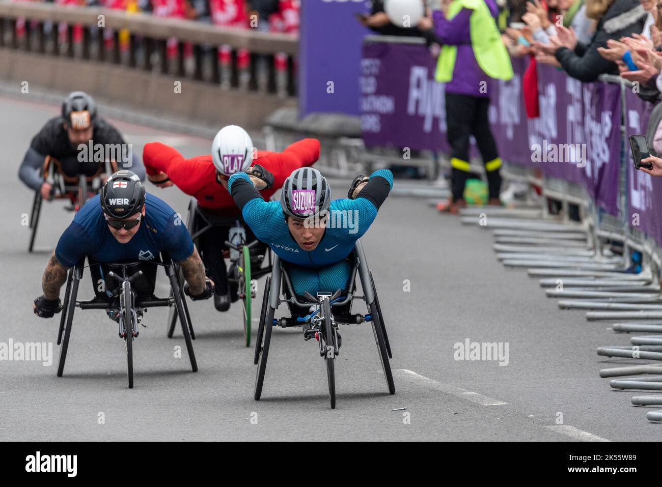 Tomoki Suzuki wheelchair athlete racing in the TCS 2022 London Marathon ...