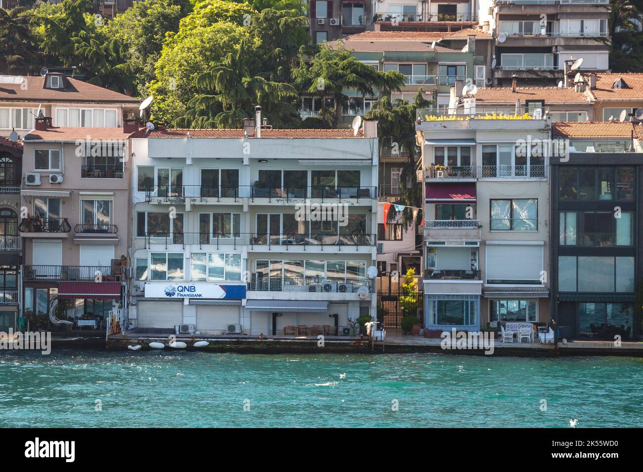 Picture of a sign with the logo of QNB Finansbank taken in front of ...