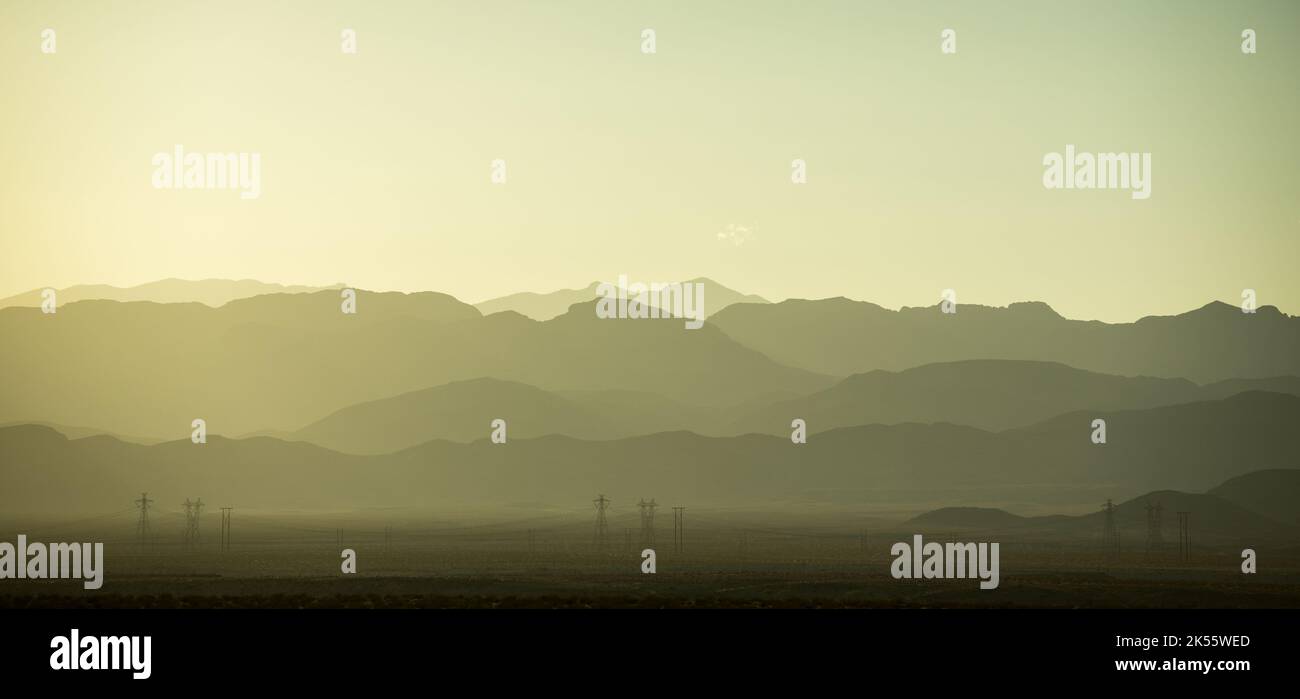 A panoramic shot of high hills with multiple layers in a gradient Stock ...