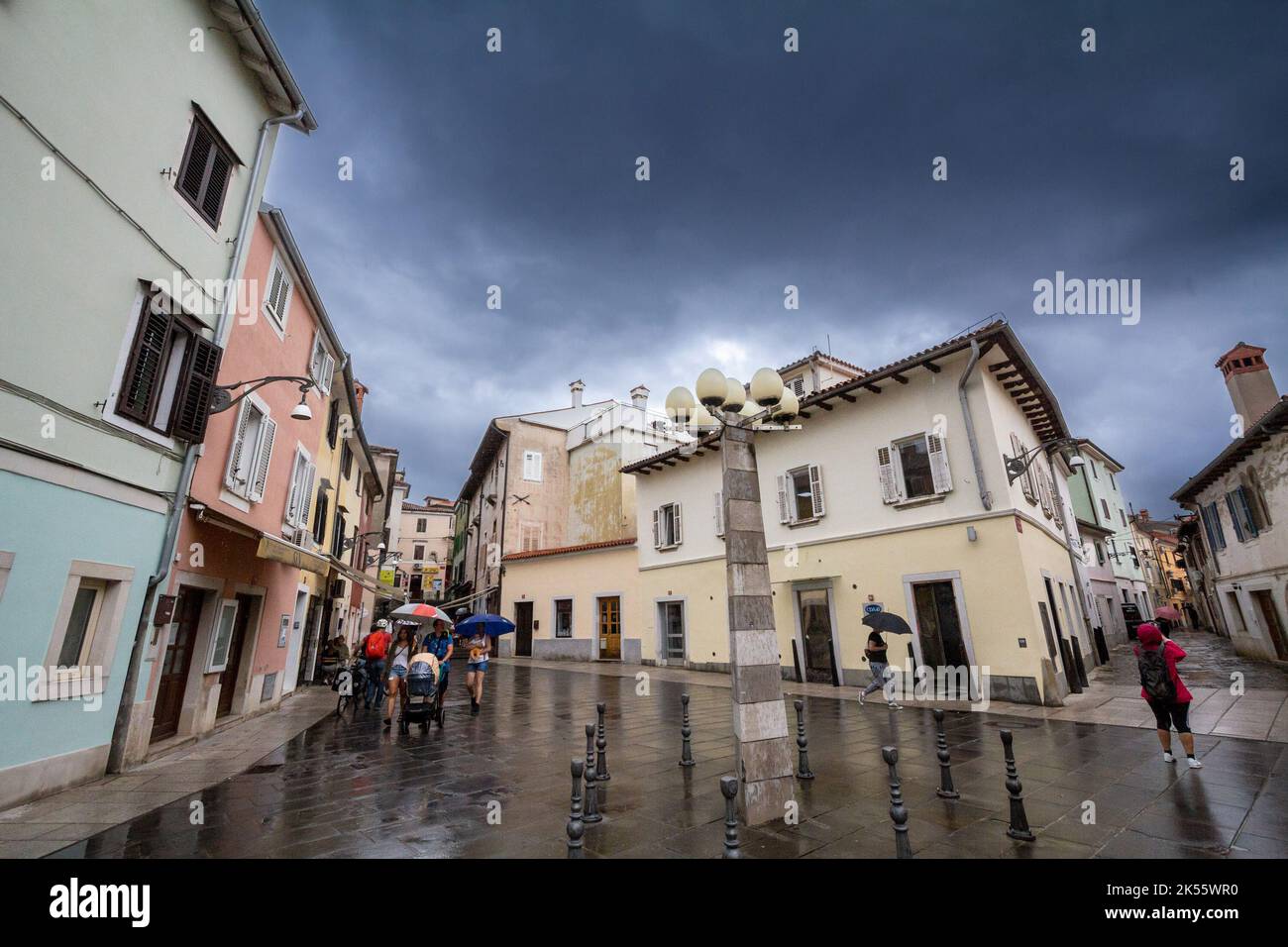 Picture of a narrow medieval street of the historical center of Koper ...
