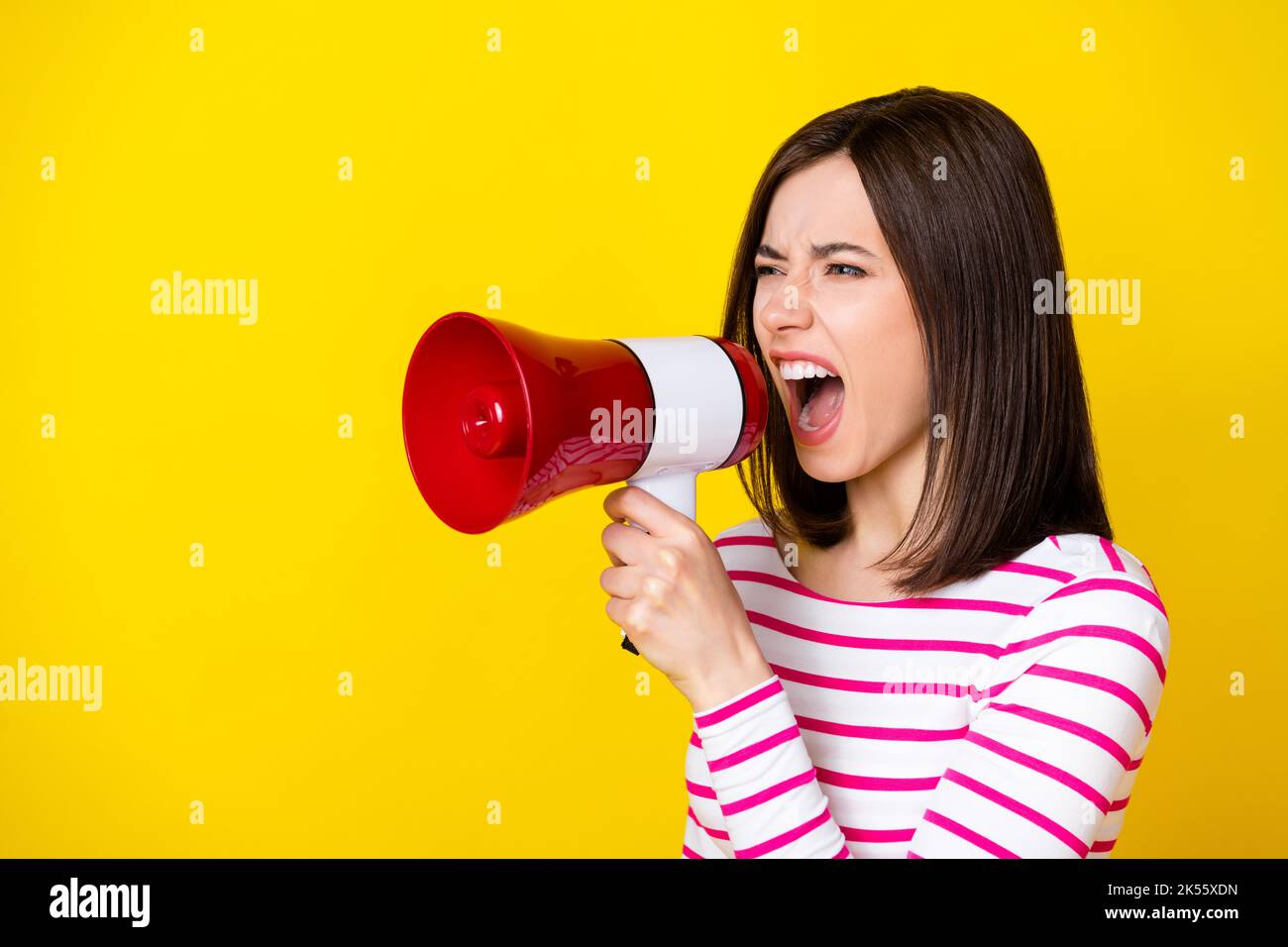Photo of angry aggressive screaming woman striped shirt shouting in ...
