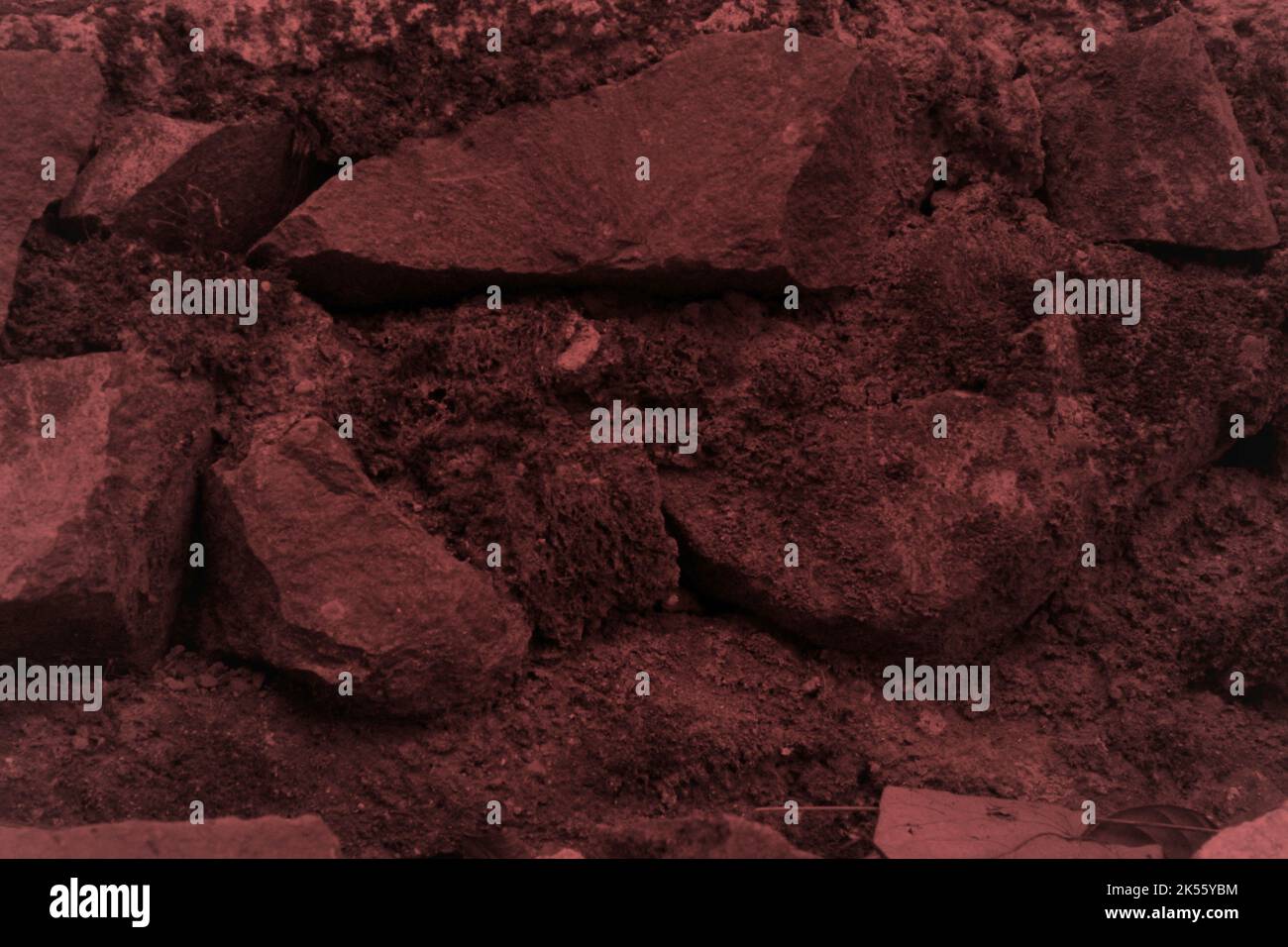A textured dark red surface, stone wall background Stock Photo - Alamy