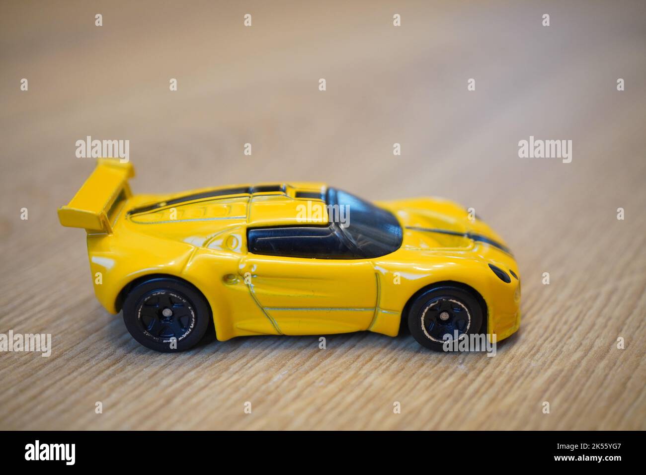 Mattel Hot Wheels yellow toy model Lotus Sport Elise race car on a ...
