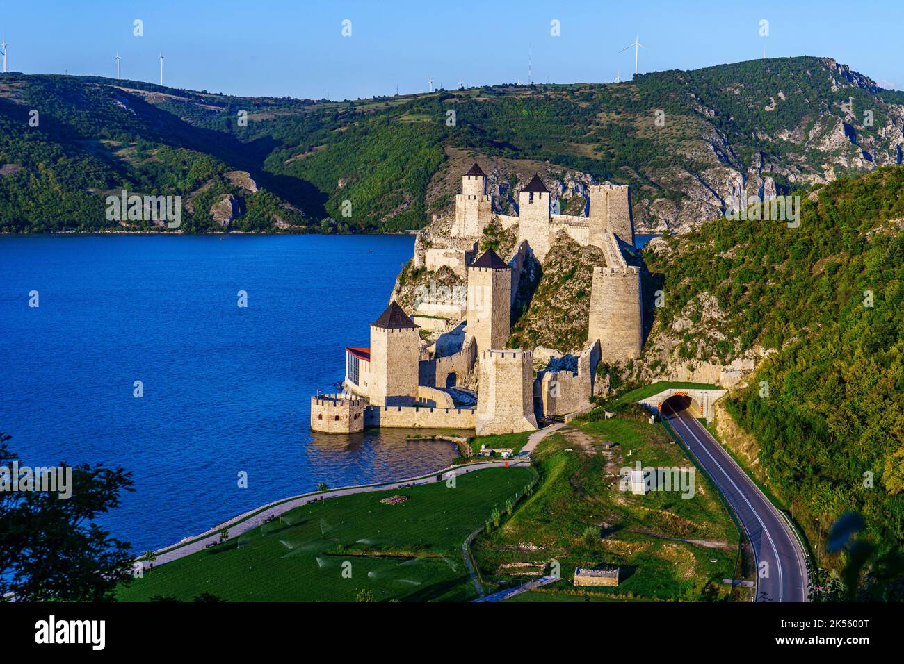 An aerial view of Golubac Fortress by Danube river and lush green vegetation in Golubac, Serbia ...