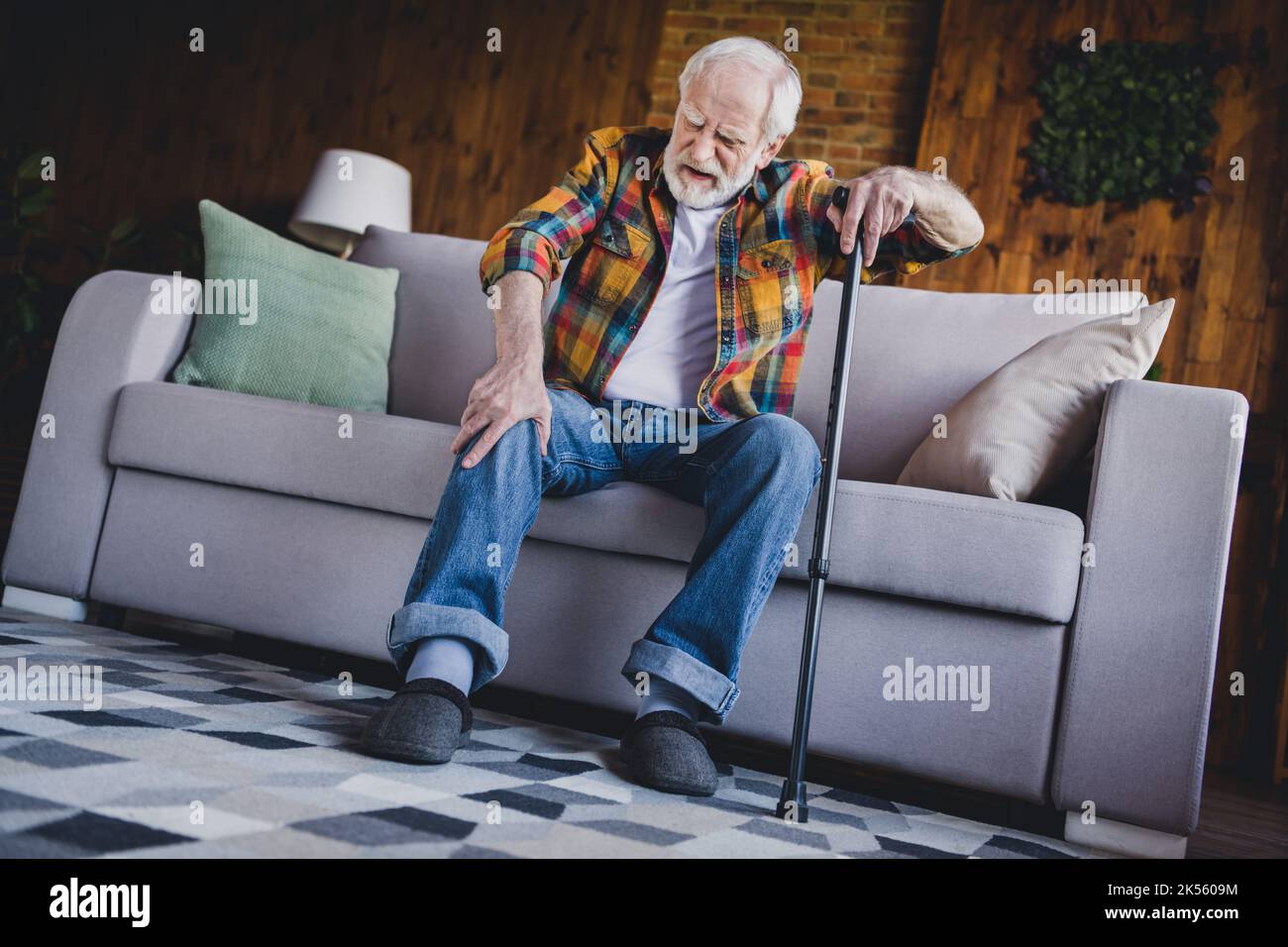 Photo of lonely stressed man pensioner wear checkered shirt holding ...