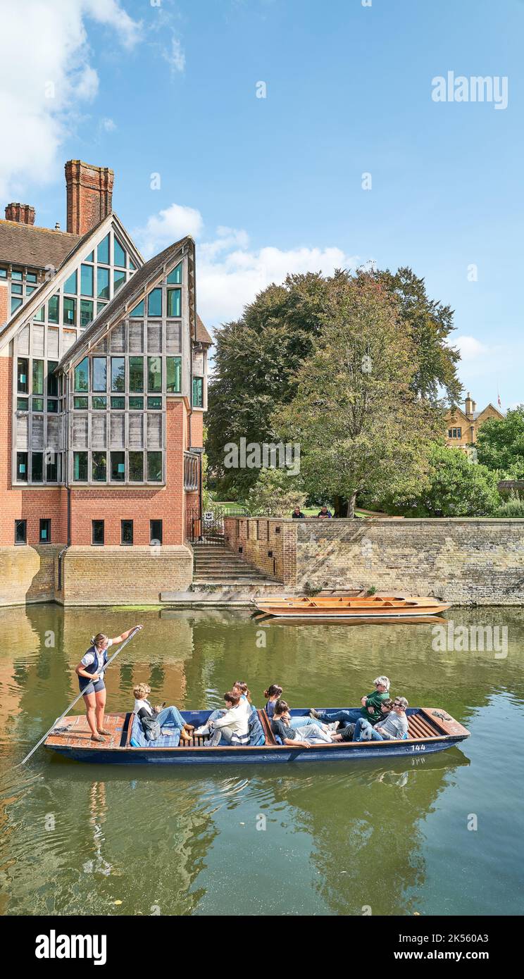 Sight-seeing tourists are punted along the river Cam beside the Jerwood ...