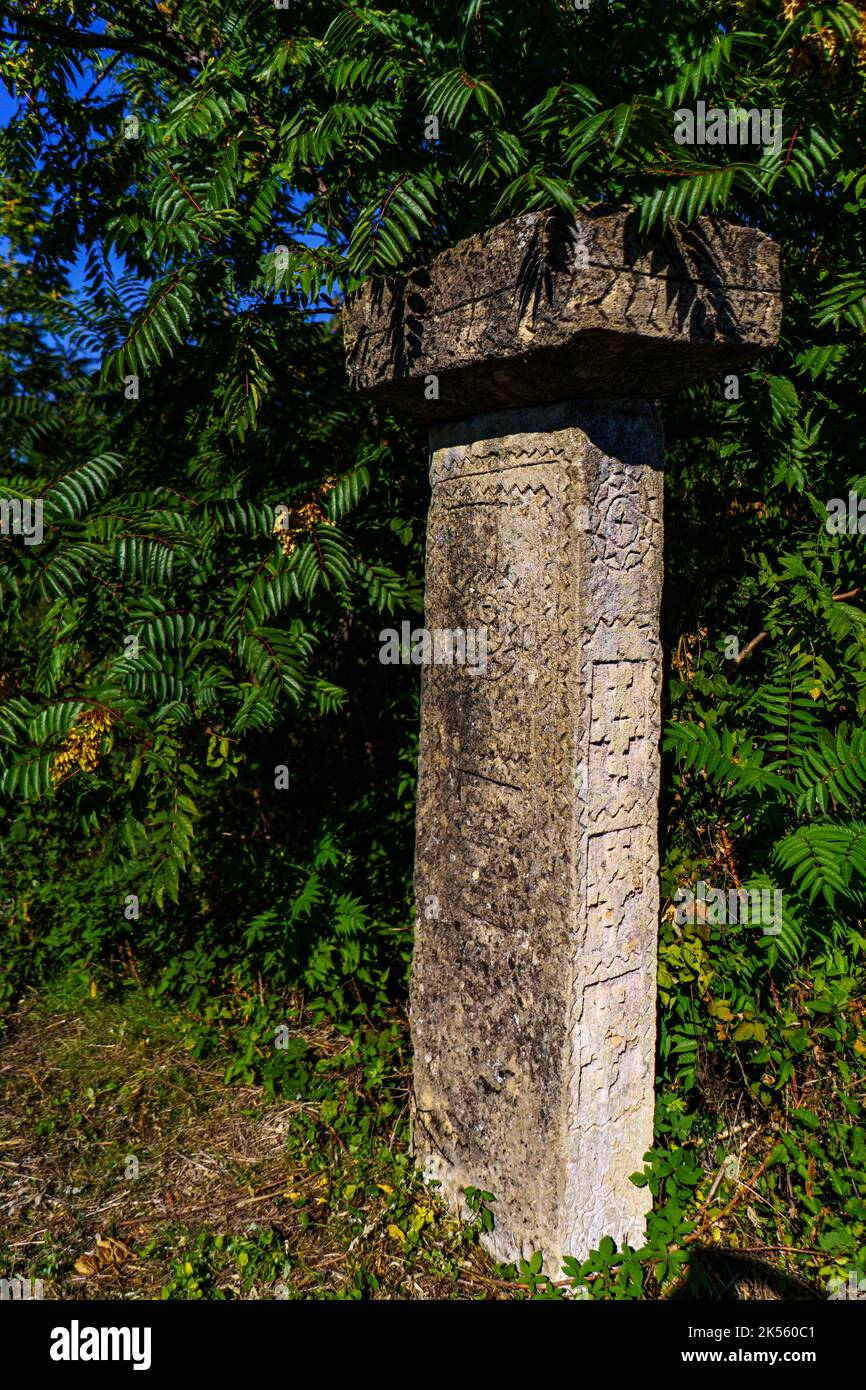 A tombstone under green tree in Rajac cemetery in Serbia - cultural ...