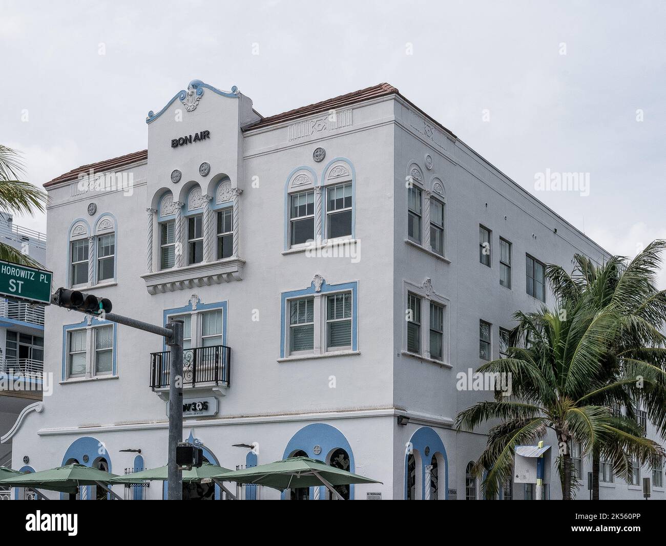 A scenic shot of an Art Deco Building white with blue highlights in ...