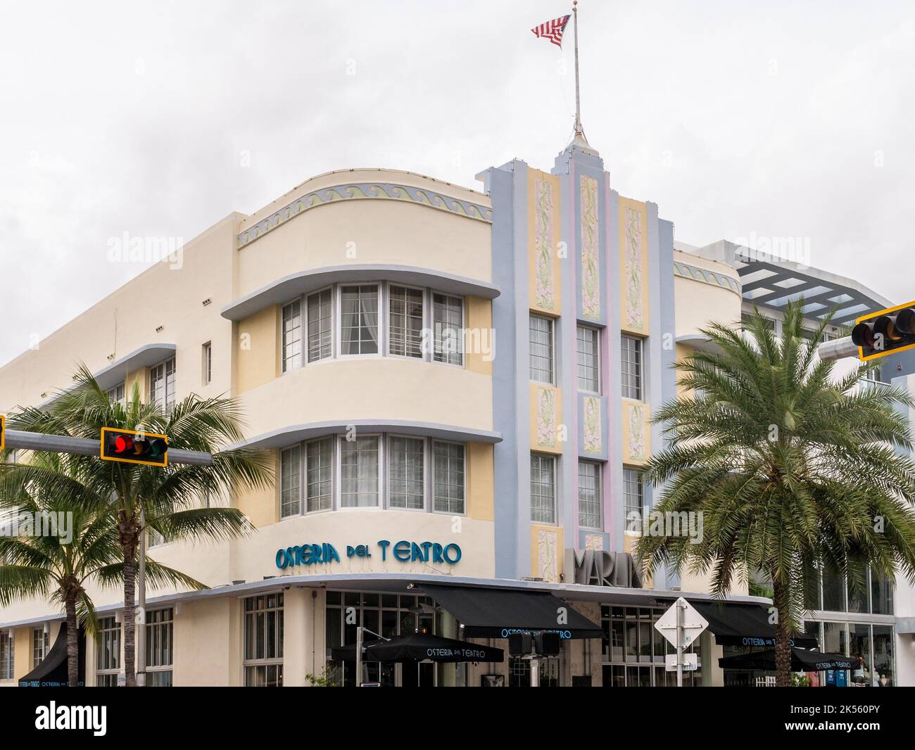 A scenic shot of an Art Deco Building light yellow with light violet ...