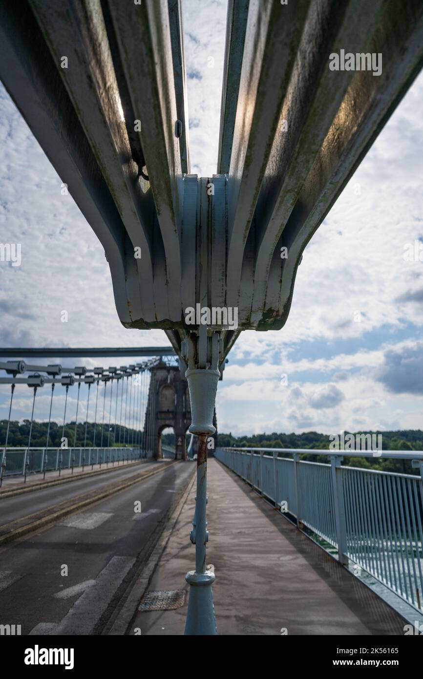 A vertical shot of the footpath and handrails of the Menai Suspension ...