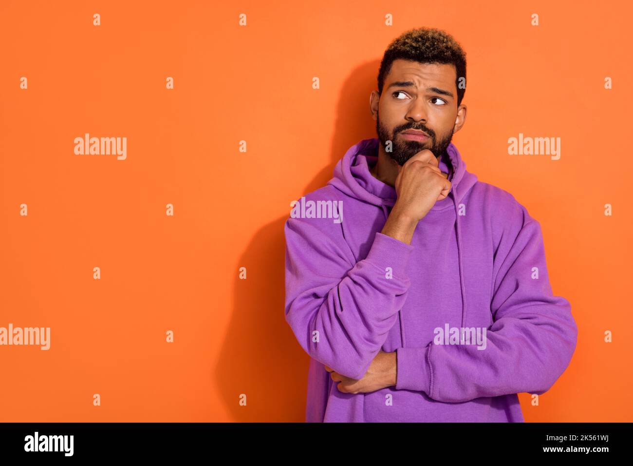 Photo of mysterious man guy violet clothes hold hand chin have dilemma ...