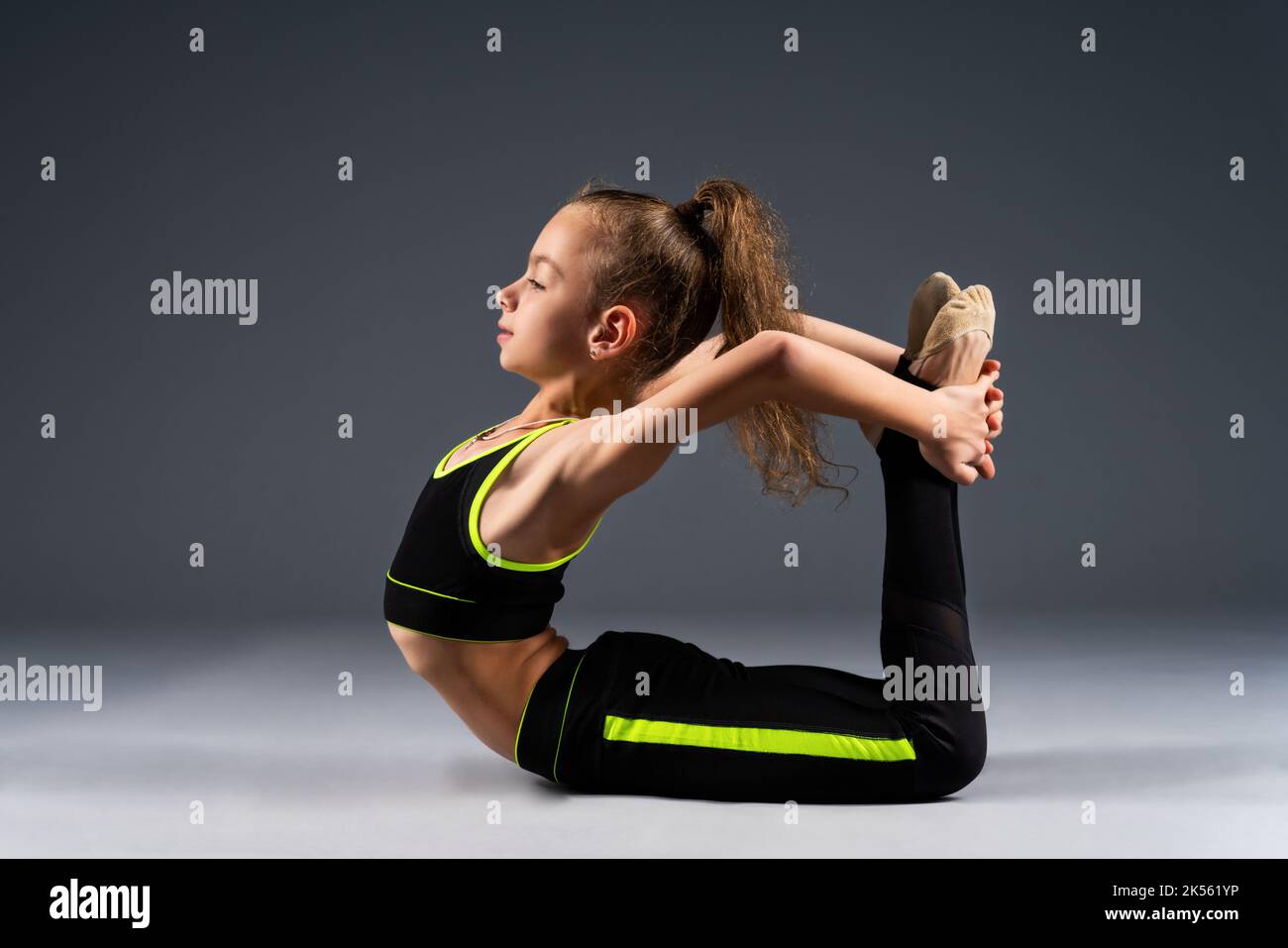 Teenager girl doing gymnastics exercises hi-res stock photography and ...