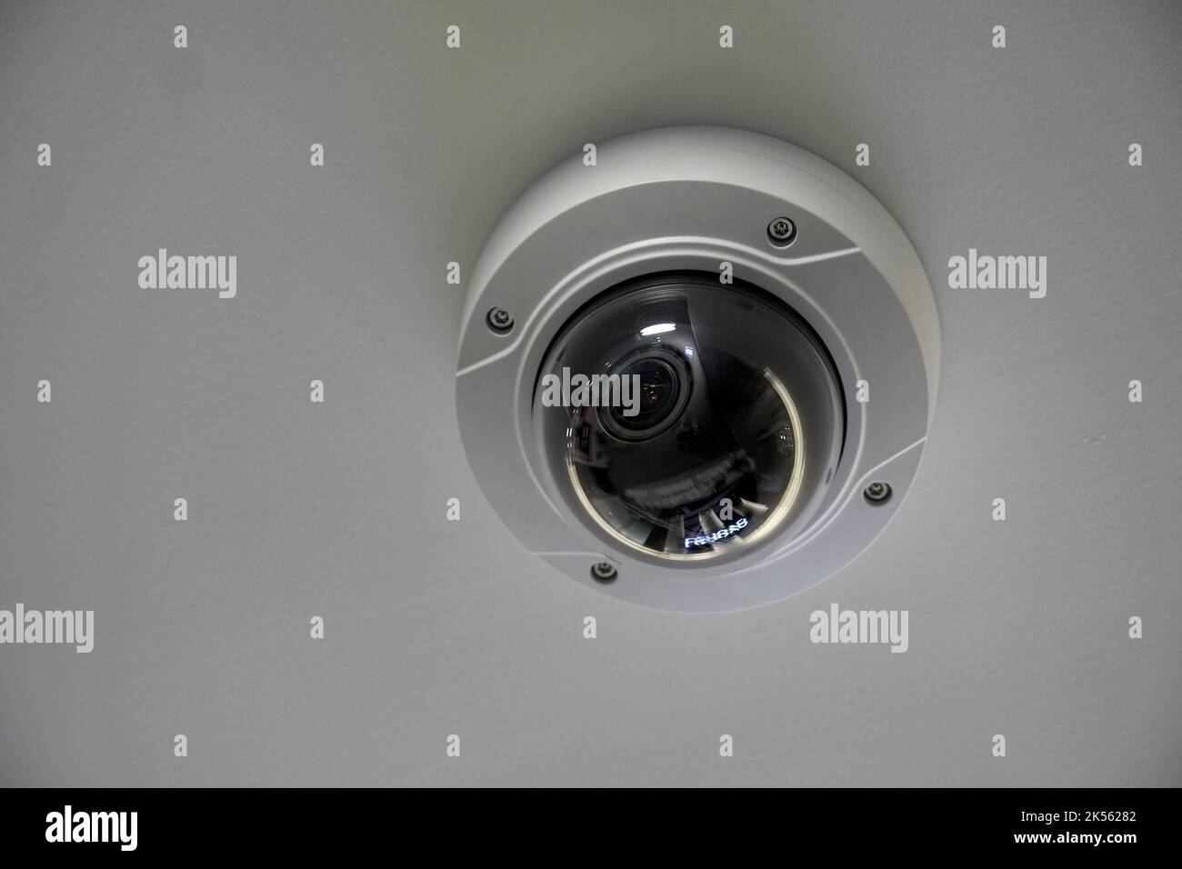 CCTV, security camera on a wall Stock Photo - Alamy
