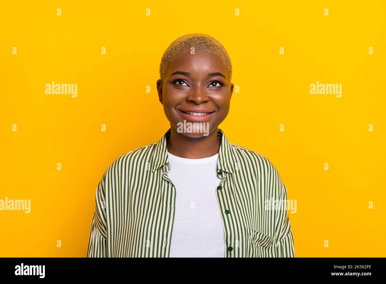 Photo of pretty positive lady beaming smile look interested up empty ...